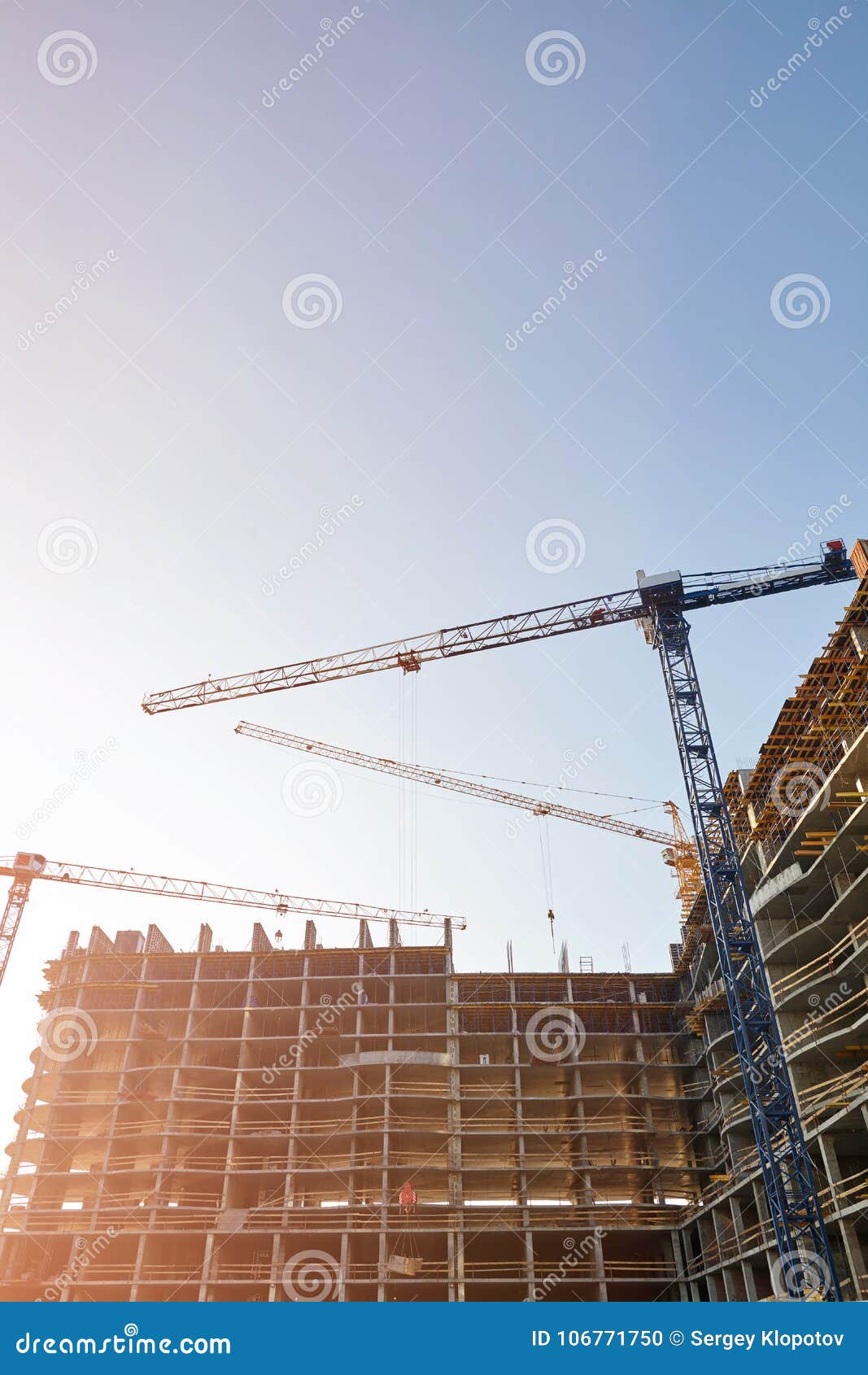 Three High-rise Modern Crane on the Construction of a Multi-storey ...