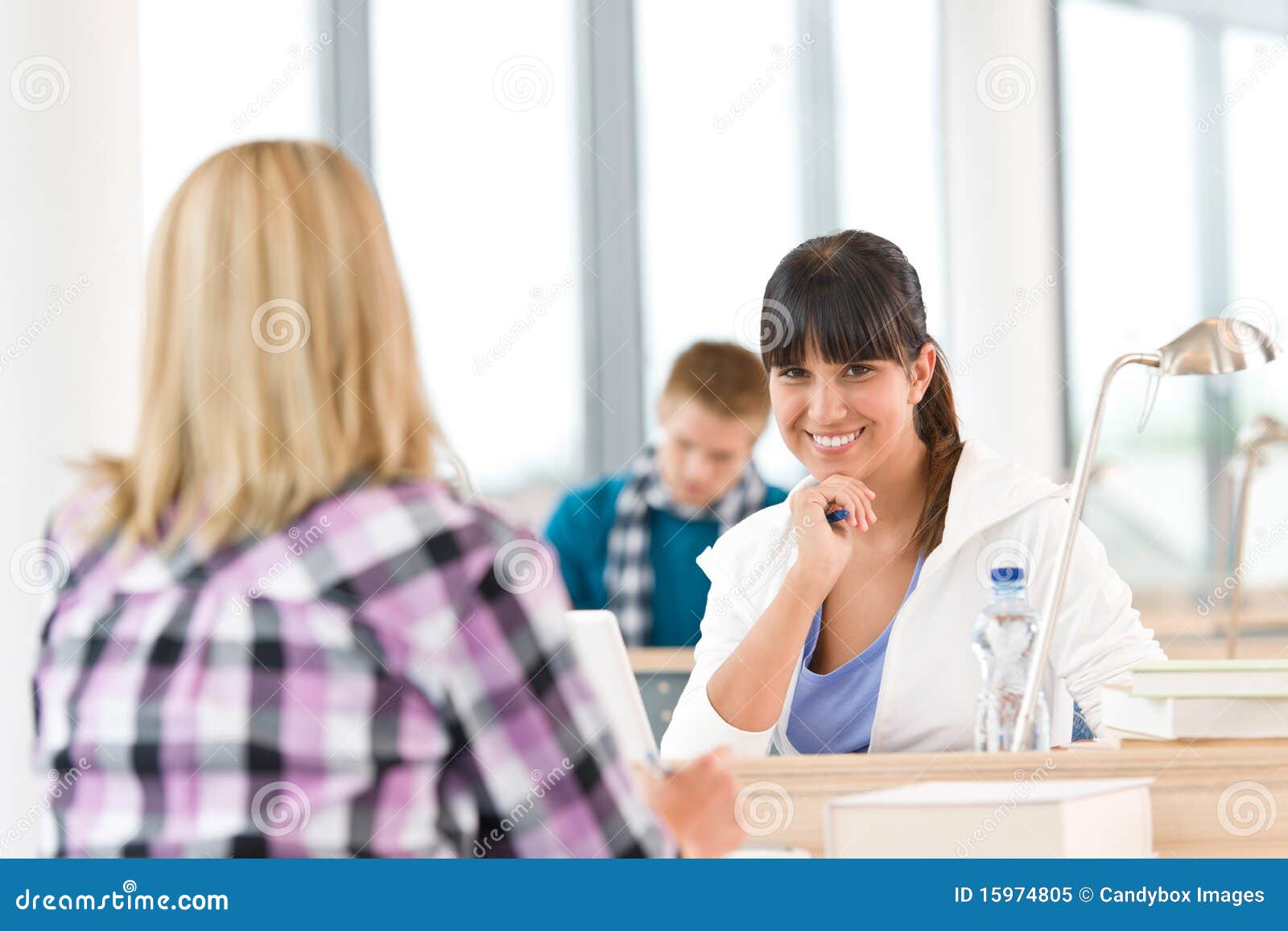 Three High School Students in Classroom Stock Image - Image of male ...
