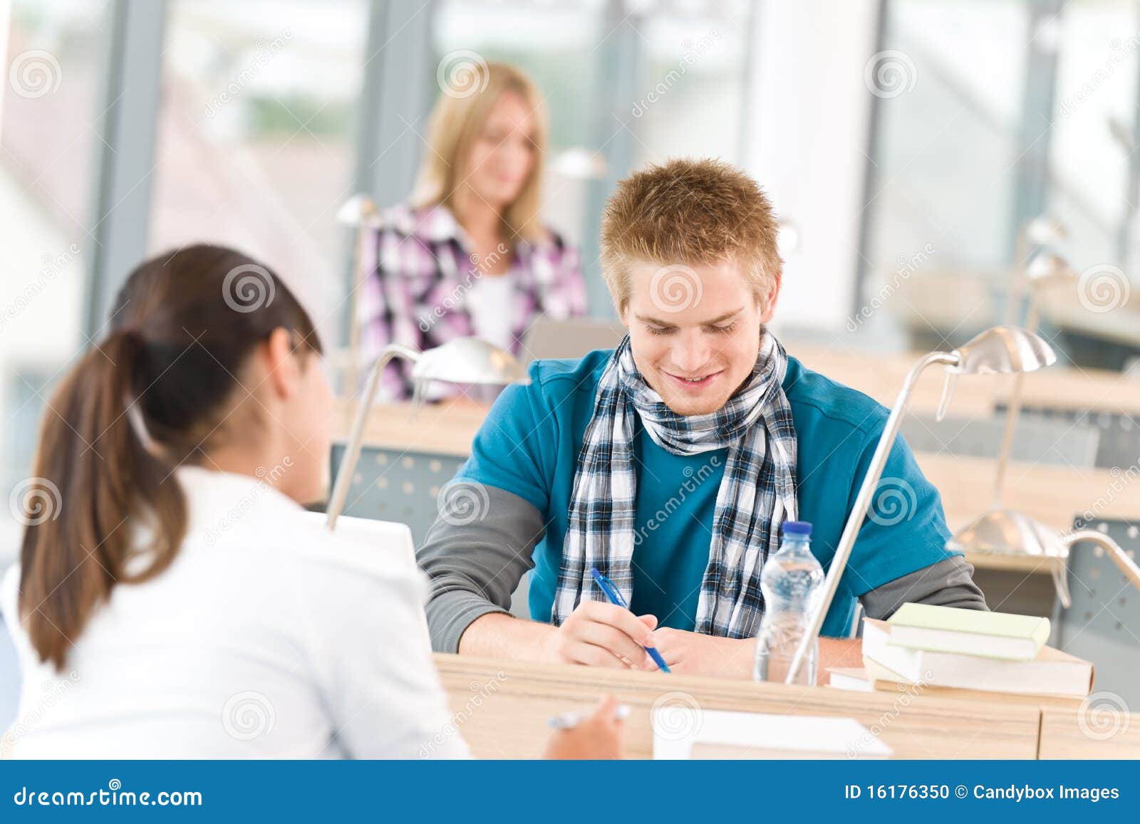 Three High School Students in Classroom Stock Photo - Image of brunette ...