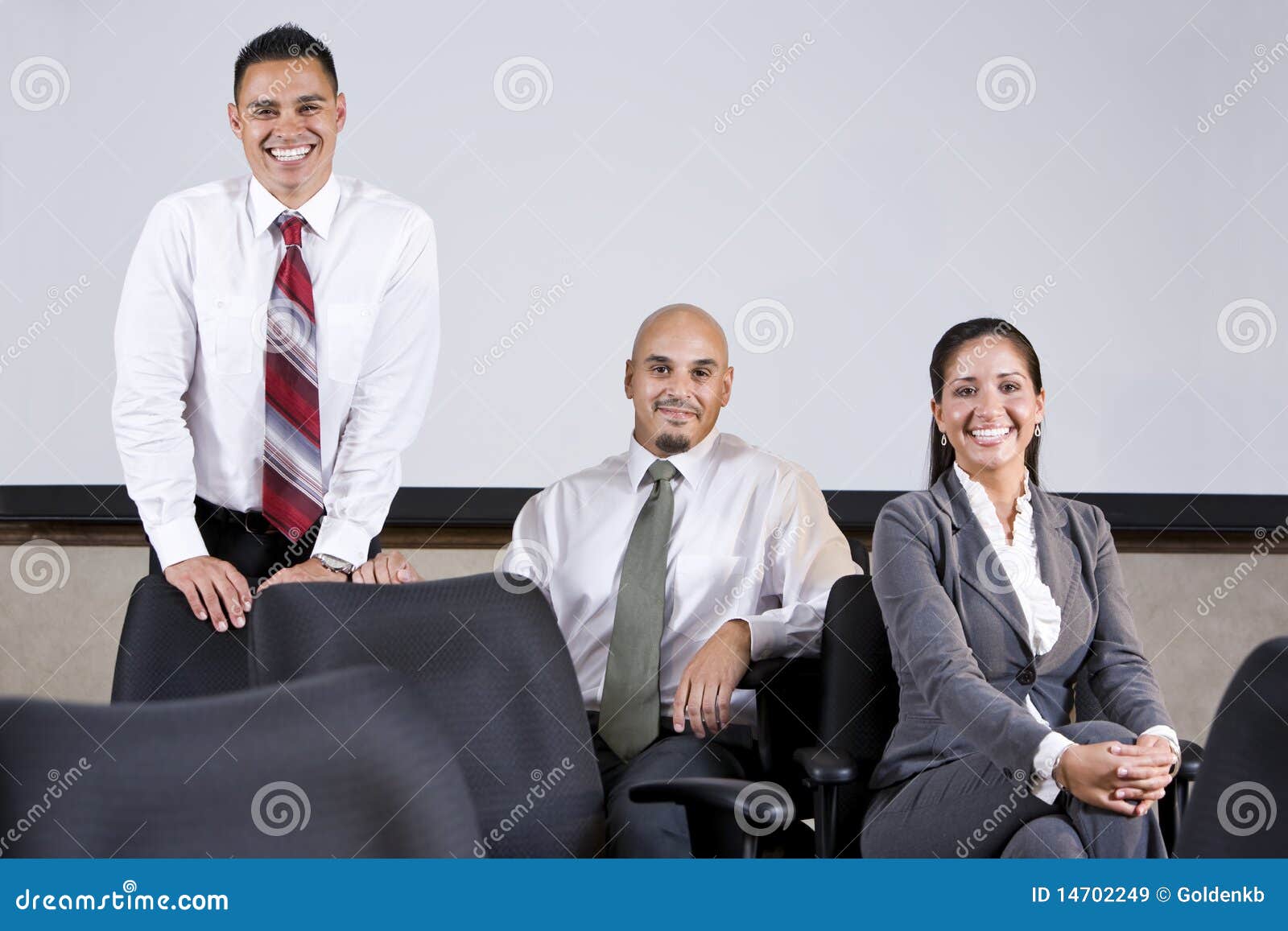 Three Hispanic Business Colleagues in Boardroom Stock Image - Image of ...
