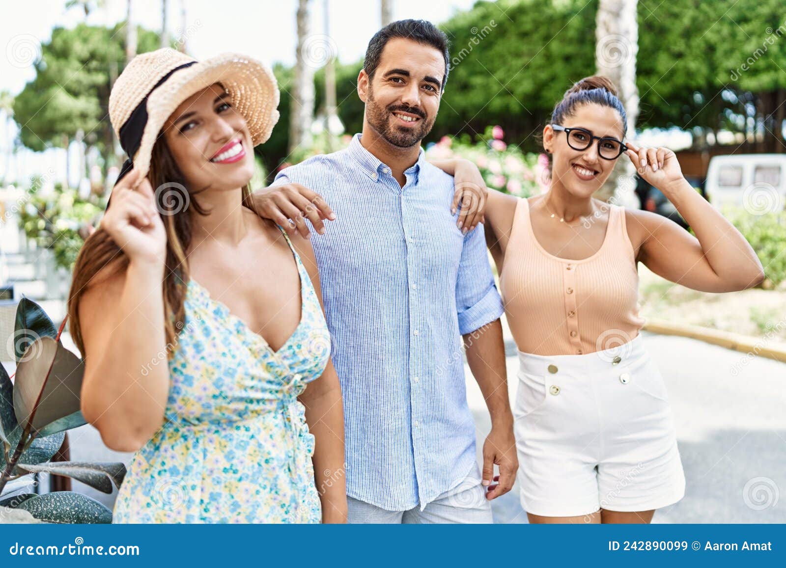 Three Hispanic Friends Smiling Happy Standing at the City Stock Image ...