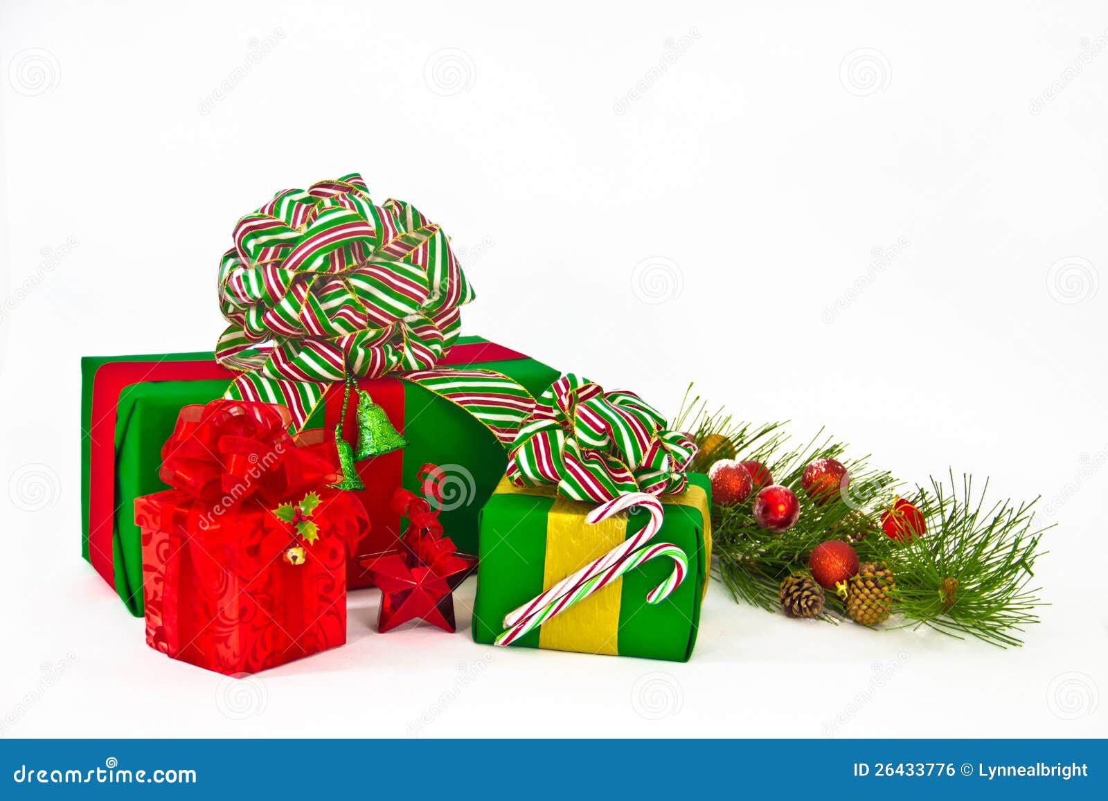 Three Holiday Presents stock photo. Image of pinecones - 26433776