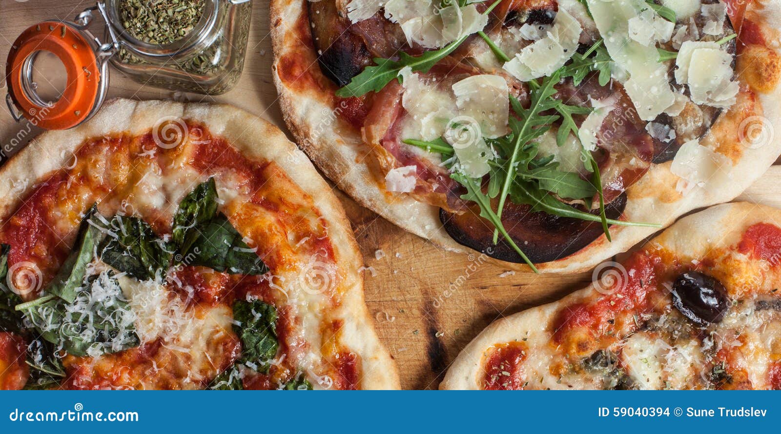 Three homemade pizzas stock photo. Image of perfectly - 59040394