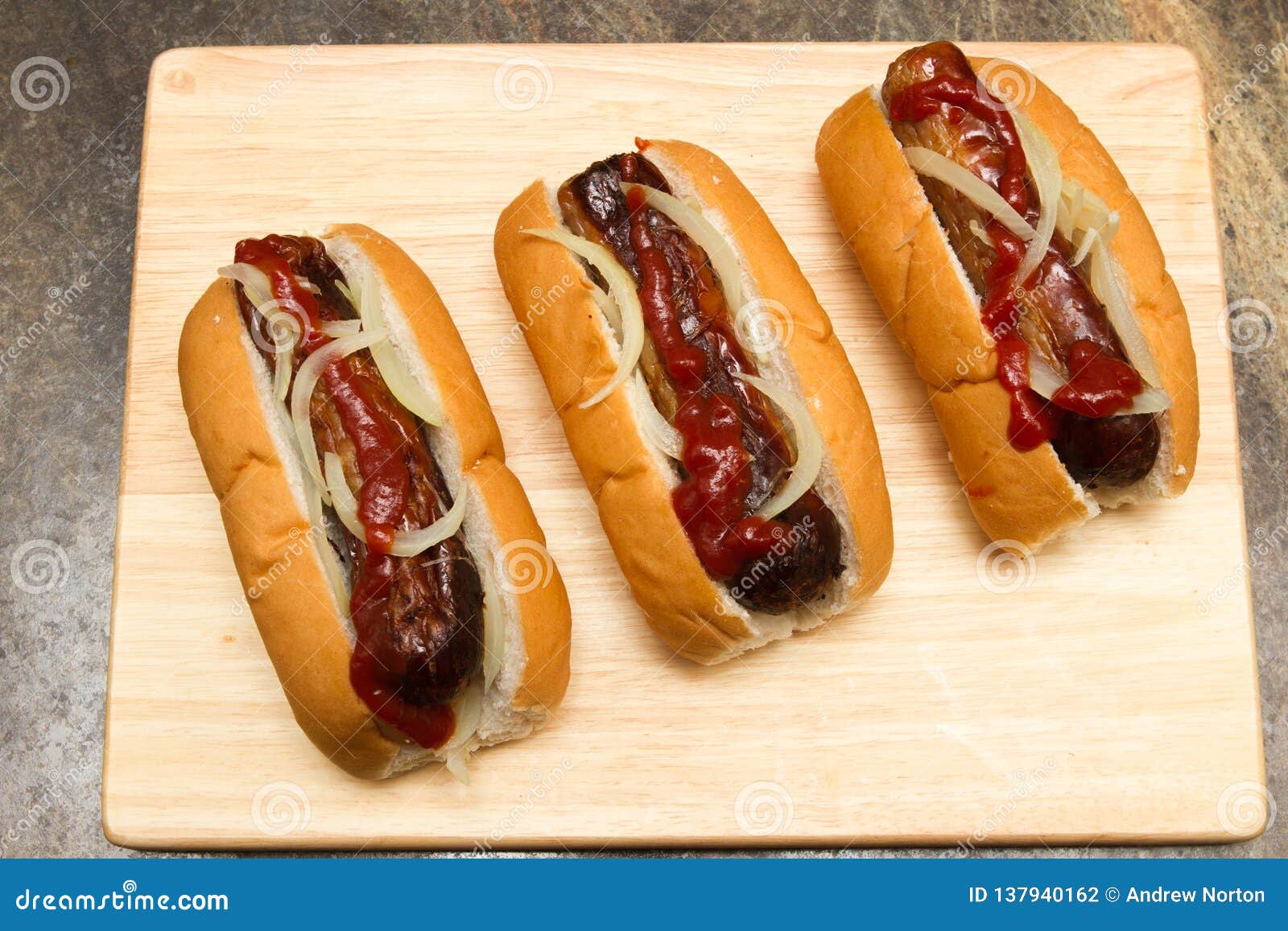 Three hot dogs stock photo. Image of ketchupn, three - 137940162