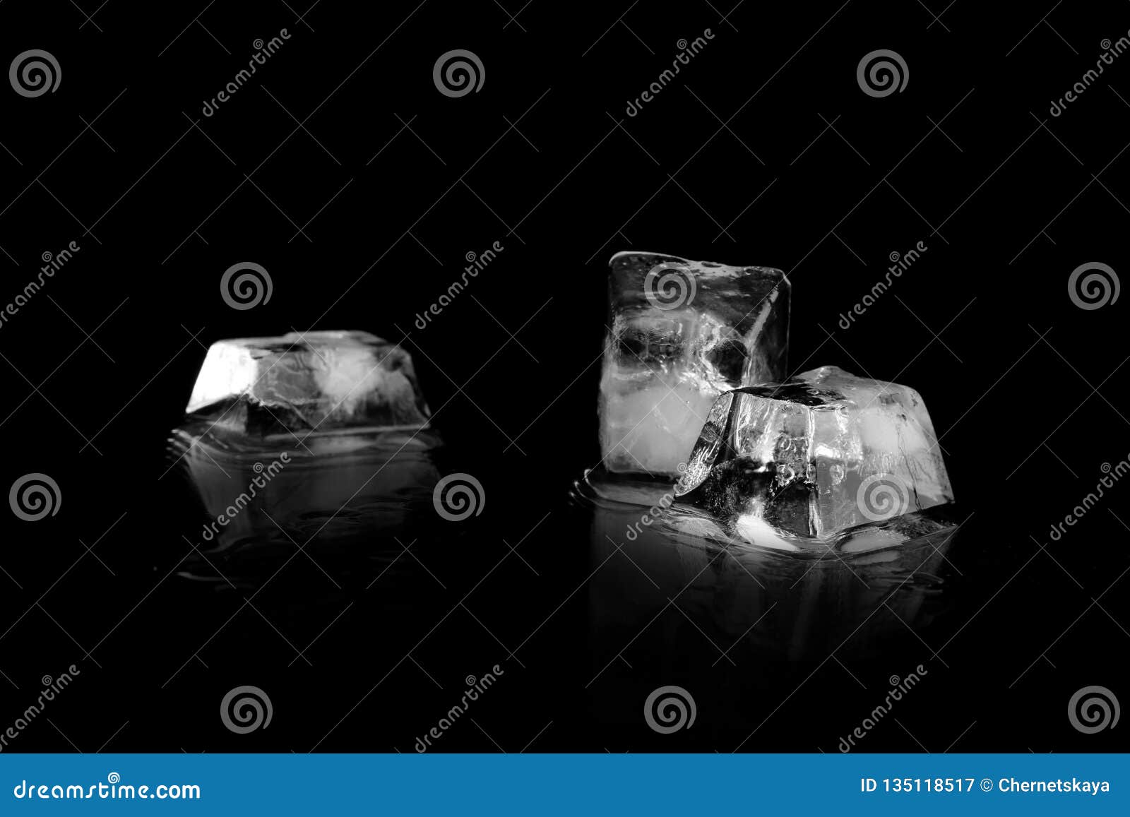 Three Ice Cubes on Black Mirror Surface. Stock Image - Image of cold ...