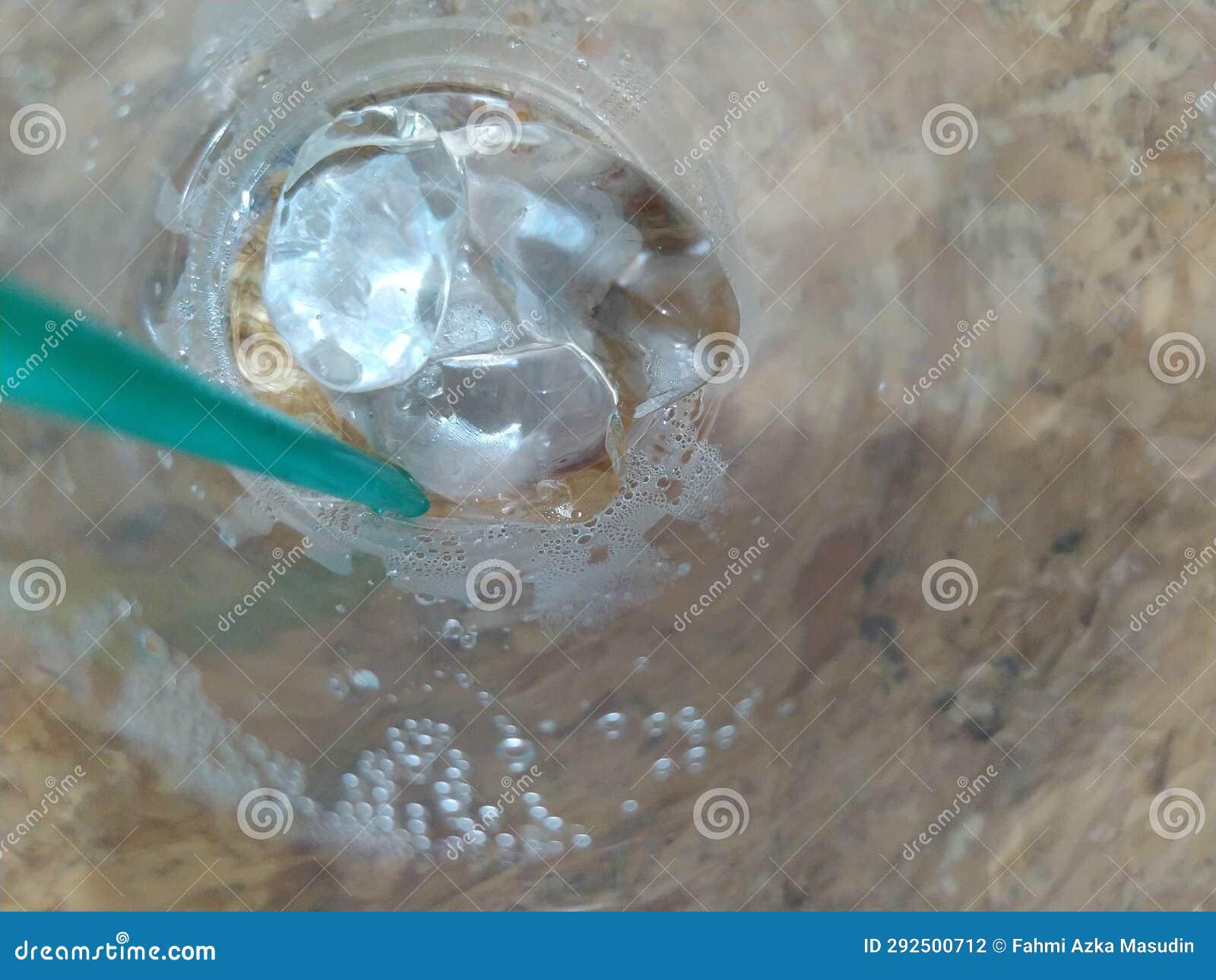 Three Ice Cubes in a Glass that Melted Slightly after Being Used for ...
