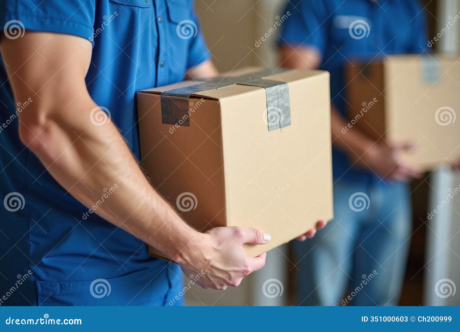 Three Individuals Handling Cardboard Boxes Stock Image - Image of ...