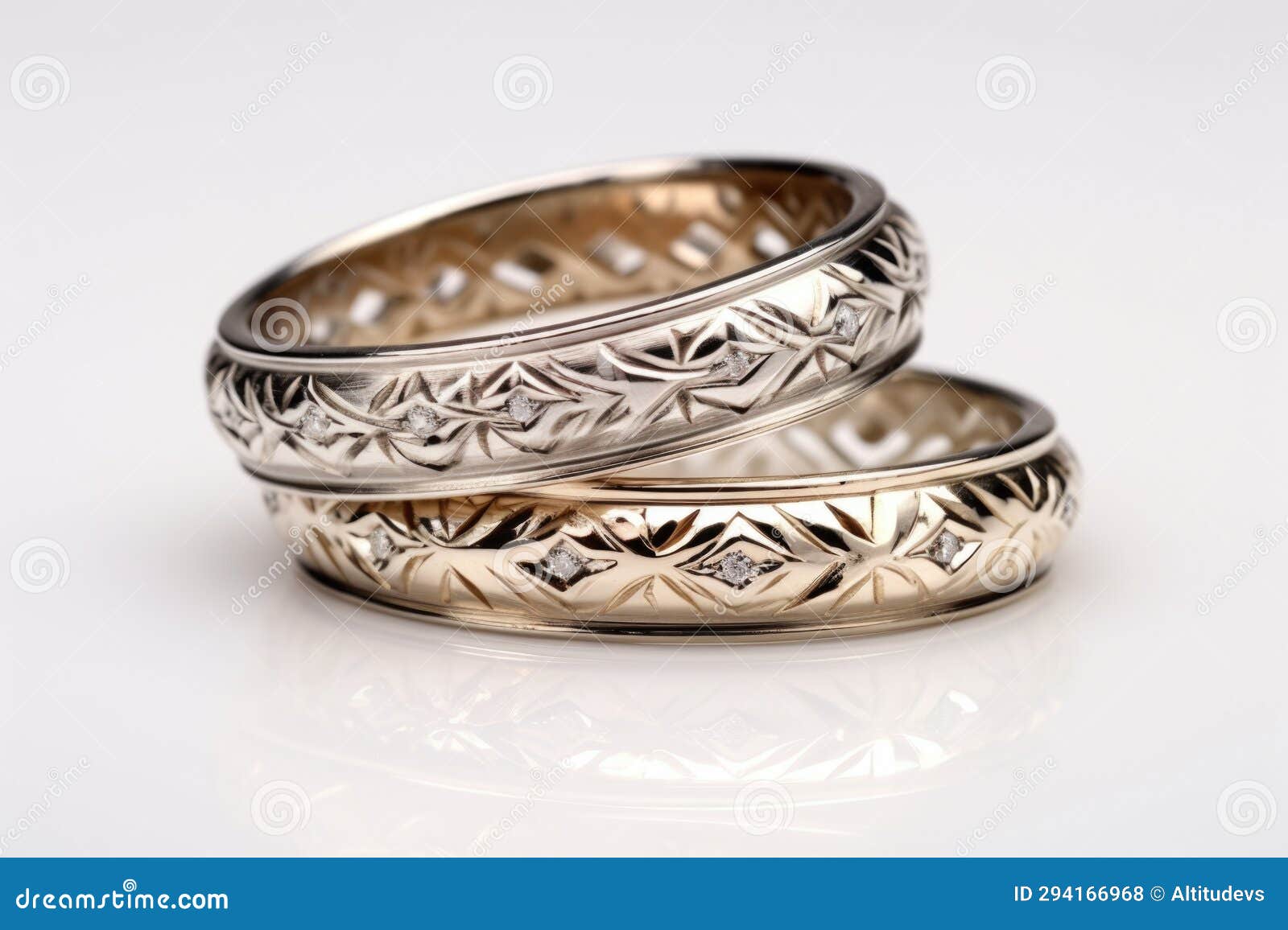Three Intertwined Metallic Rings with Engravings Stock Photo - Image of ...
