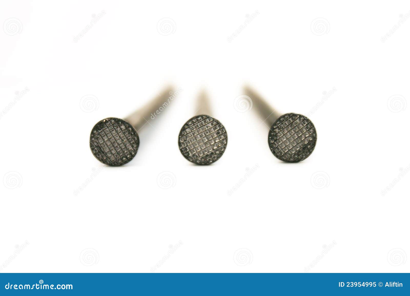 Three iron nails stock image. Image of steel, pattern - 23954995