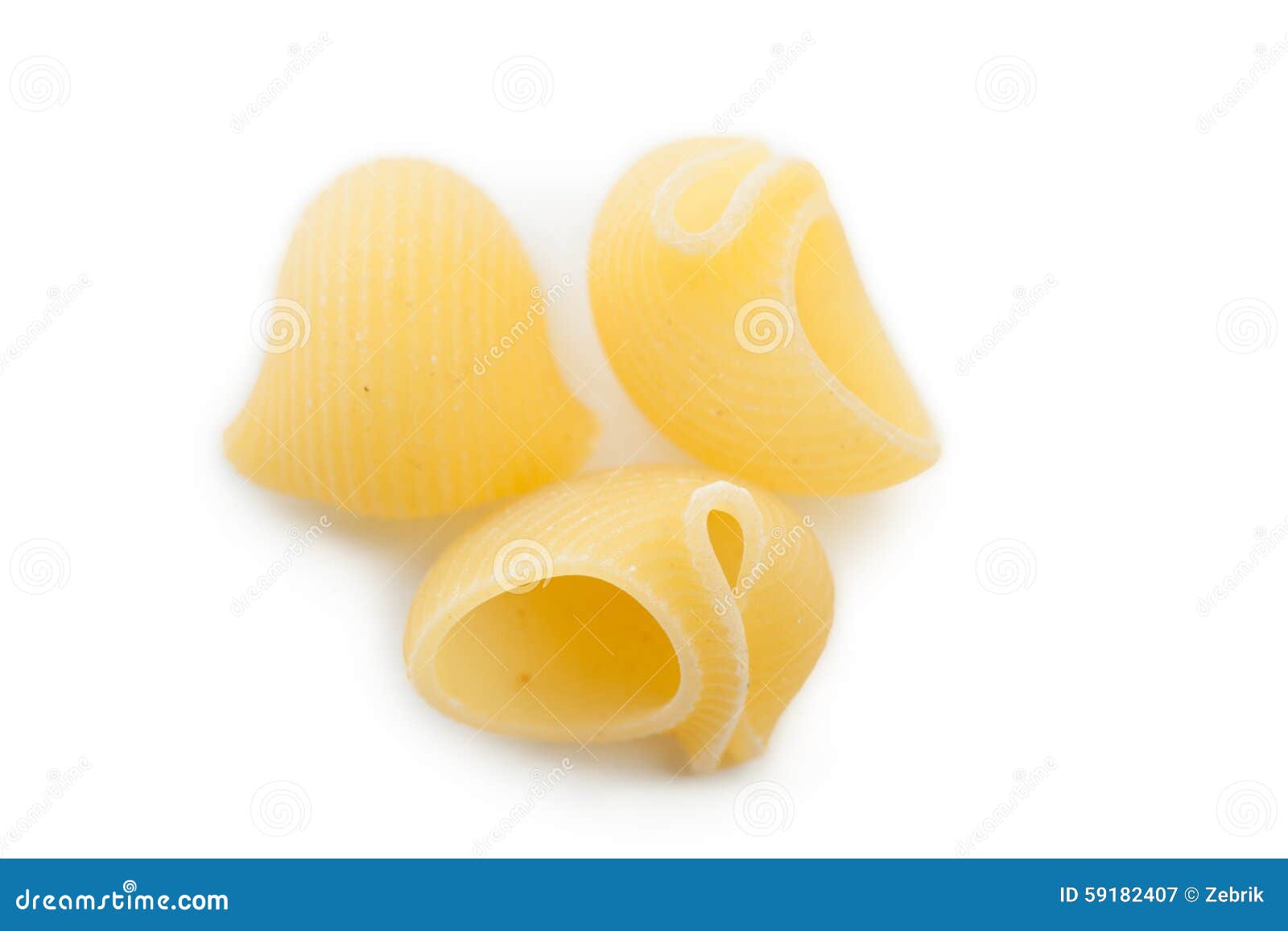 Three of Italian Macaroni Shells, Selective Focus. Isolated Stock Image ...
