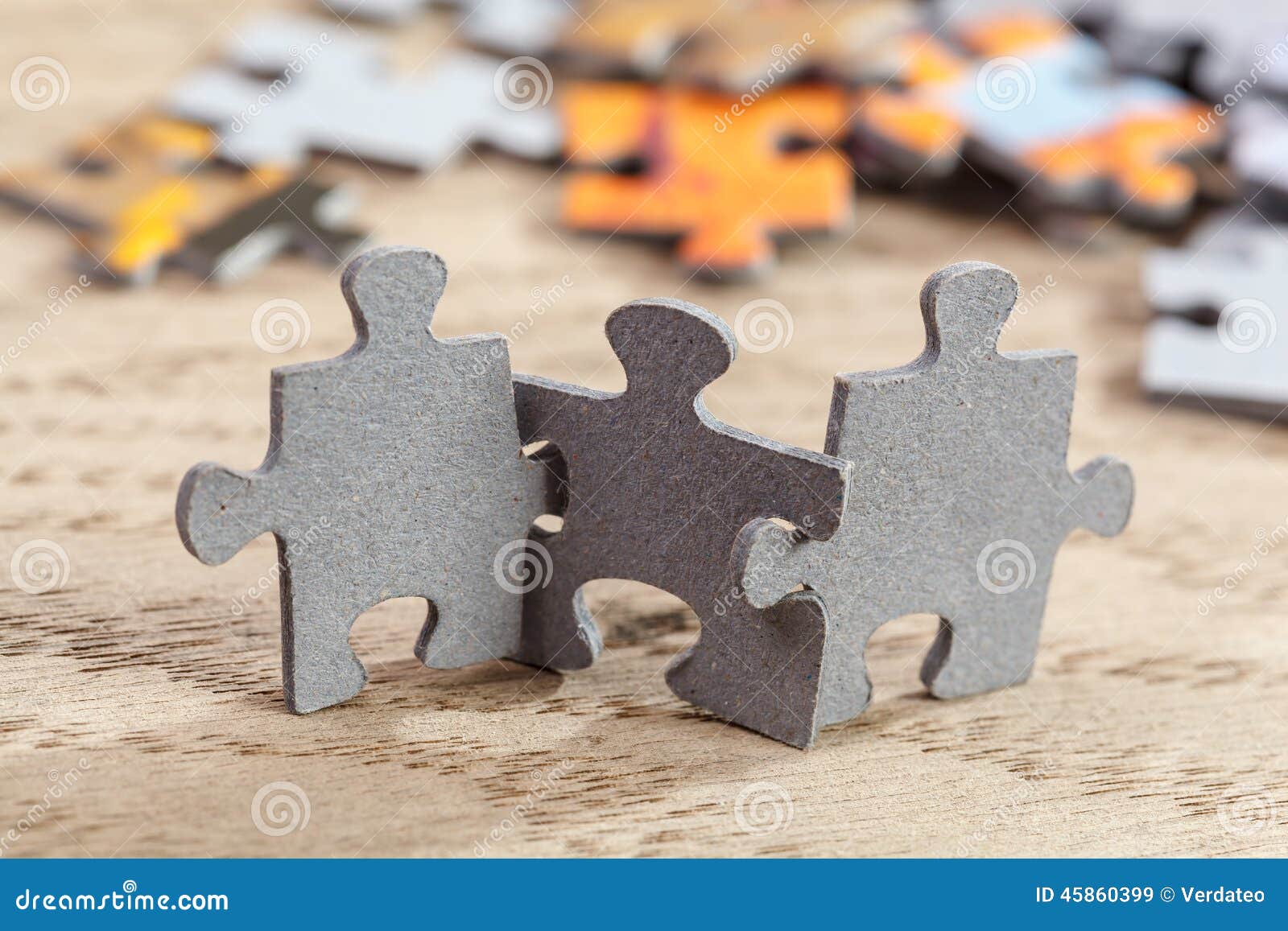 Three Jigsaw Puzzle Pieces on Table Stock Image - Image of metaphor ...