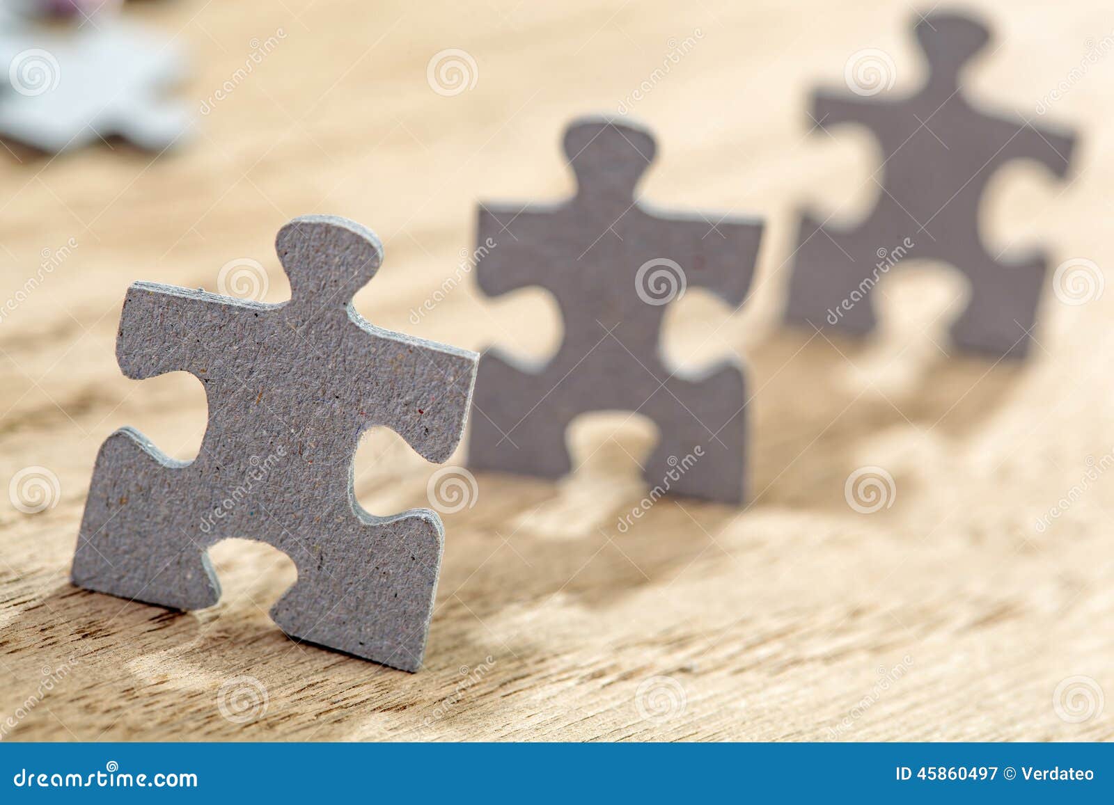 Three Jigsaw Puzzle Pieces on Table Stock Image - Image of solve, idea ...