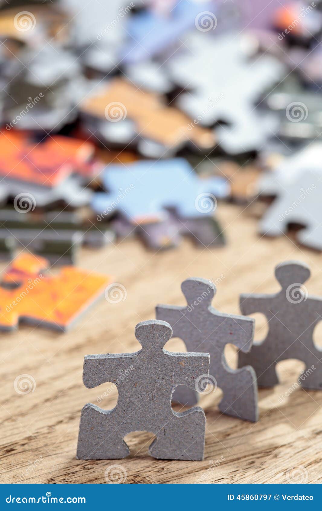 Three Jigsaw Puzzle Pieces on Table Stock Image - Image of solve, hands ...