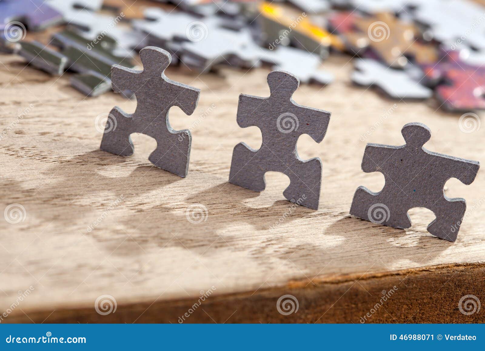 Three Jigsaw Puzzle Pieces on Table Stock Image - Image of solving ...
