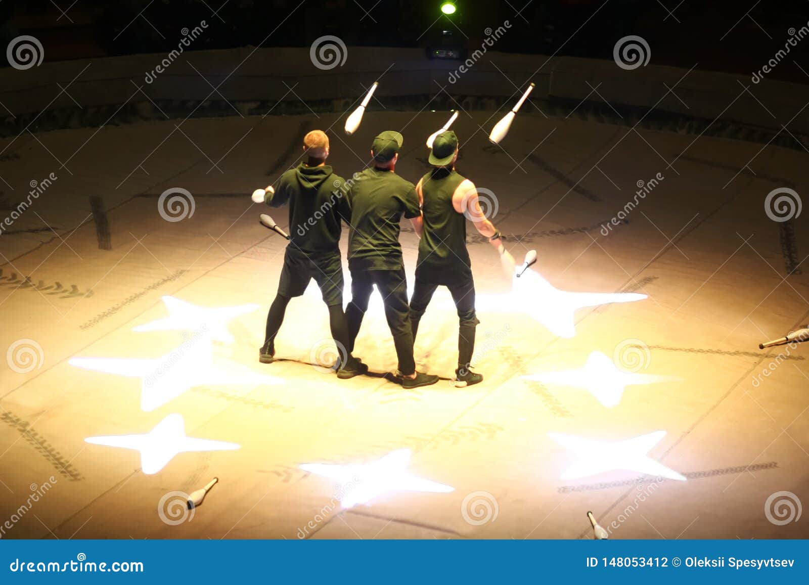 Three Jugglers / Circus Performers at Work on Stage. Editorial ...