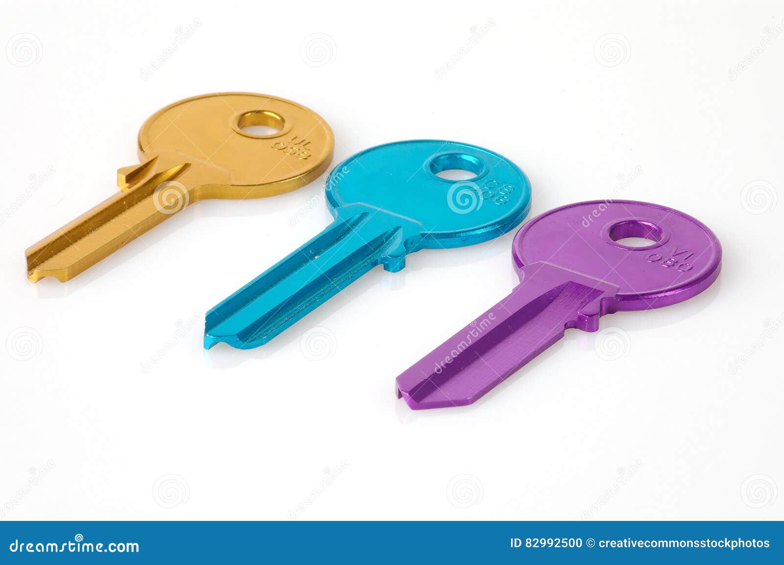 Three Keys In A White Background Photo Picture. Image: 82992500
