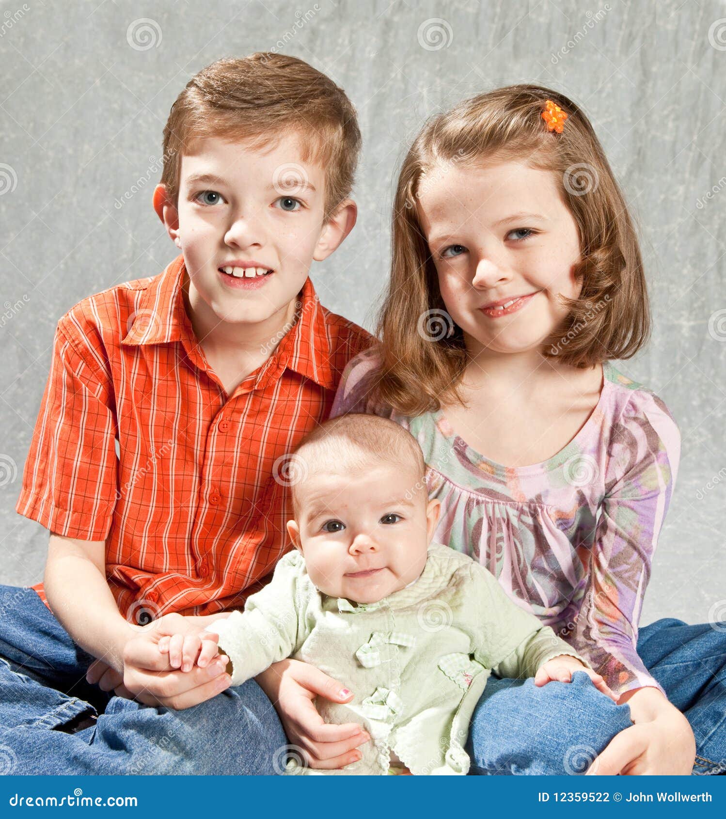 Three kids stock photo. Image of posing, glad, baby, group - 12359522