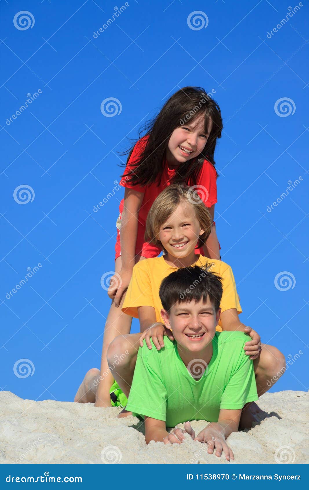 Three kids on beach stock photo. Image of sandy, male - 11538970