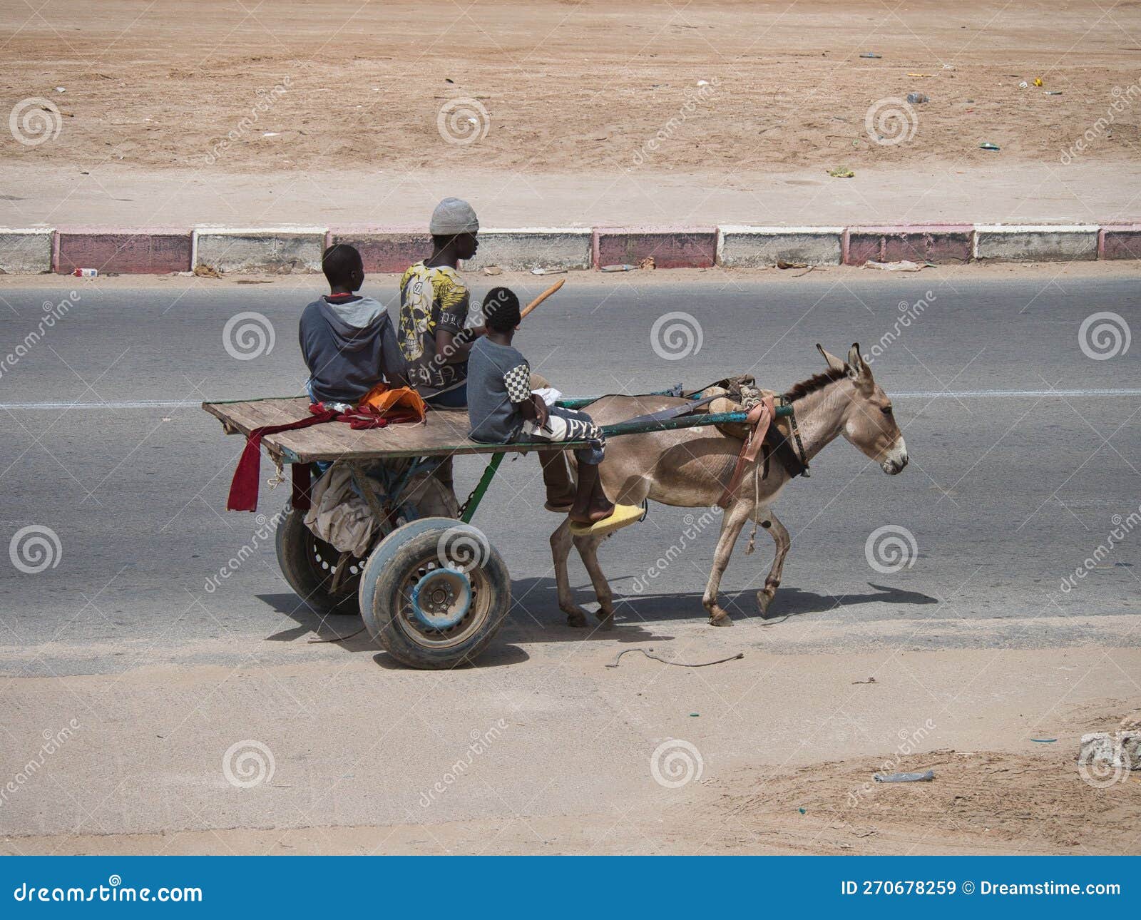 Kids On A Donkey In Africa Editorial Image | CartoonDealer.com #24471778