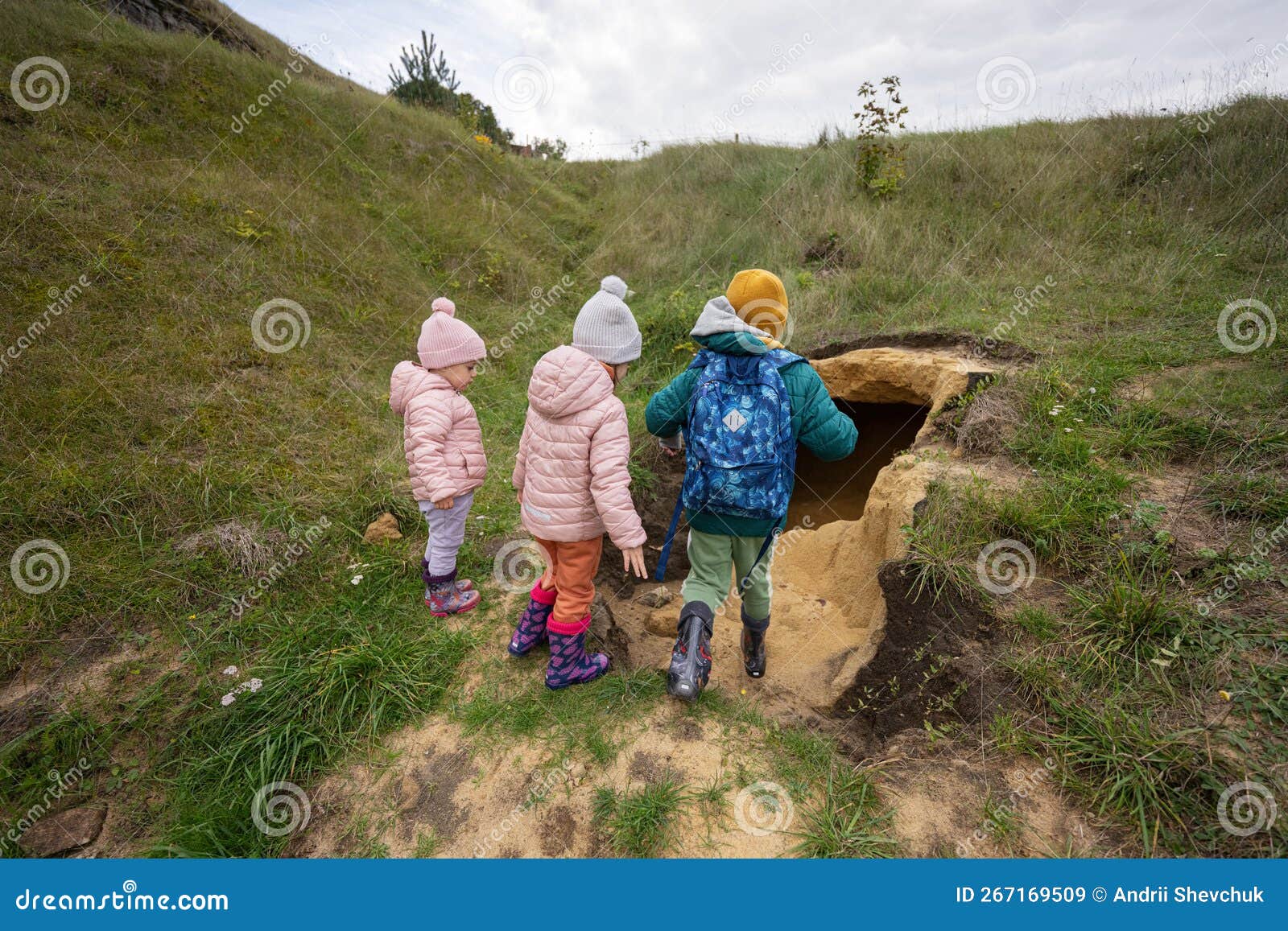 Three Kids Explore Limestone Stone Cave at Mountain Stock Image - Image ...