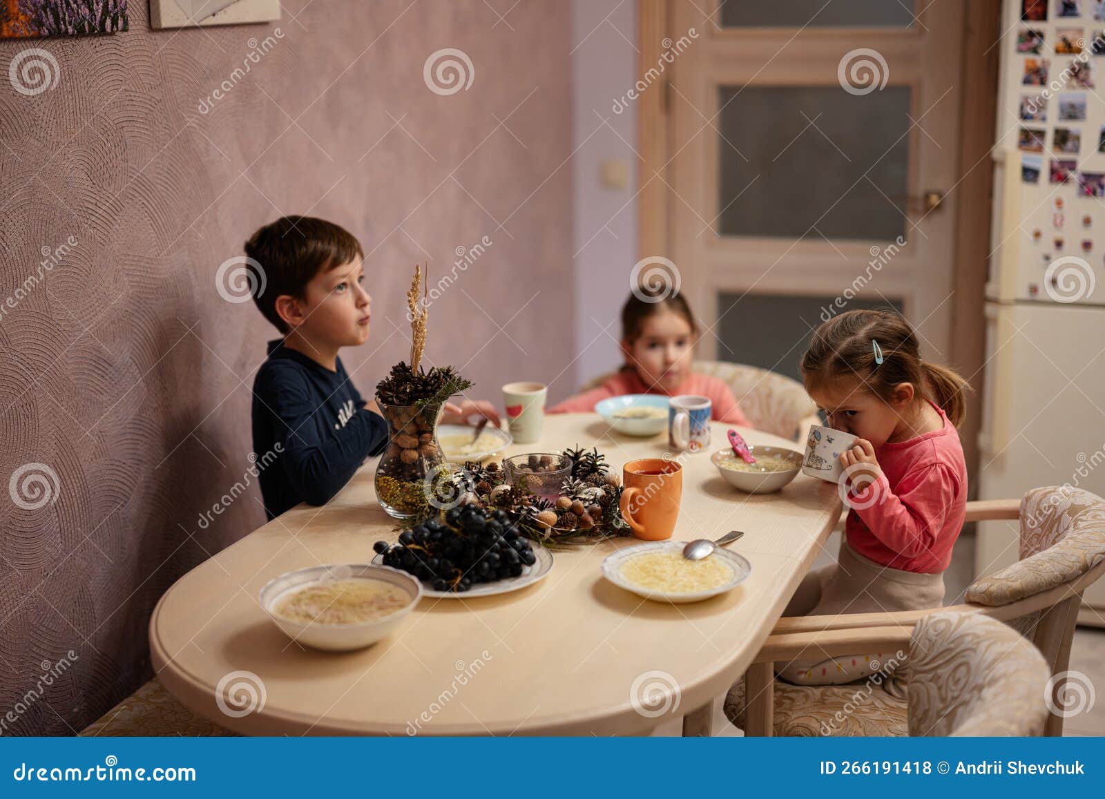 Three Kids Have Dinner Together in the Kitchen Stock Photo - Image of ...