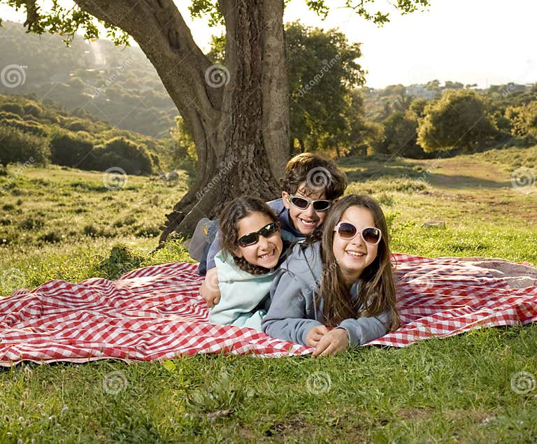 Three kids having fun stock image. Image of garden, park - 15938415