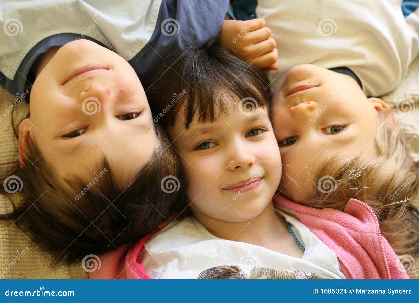 Three Kids Having Fun stock photo. Image of amiable, amiably - 1605324