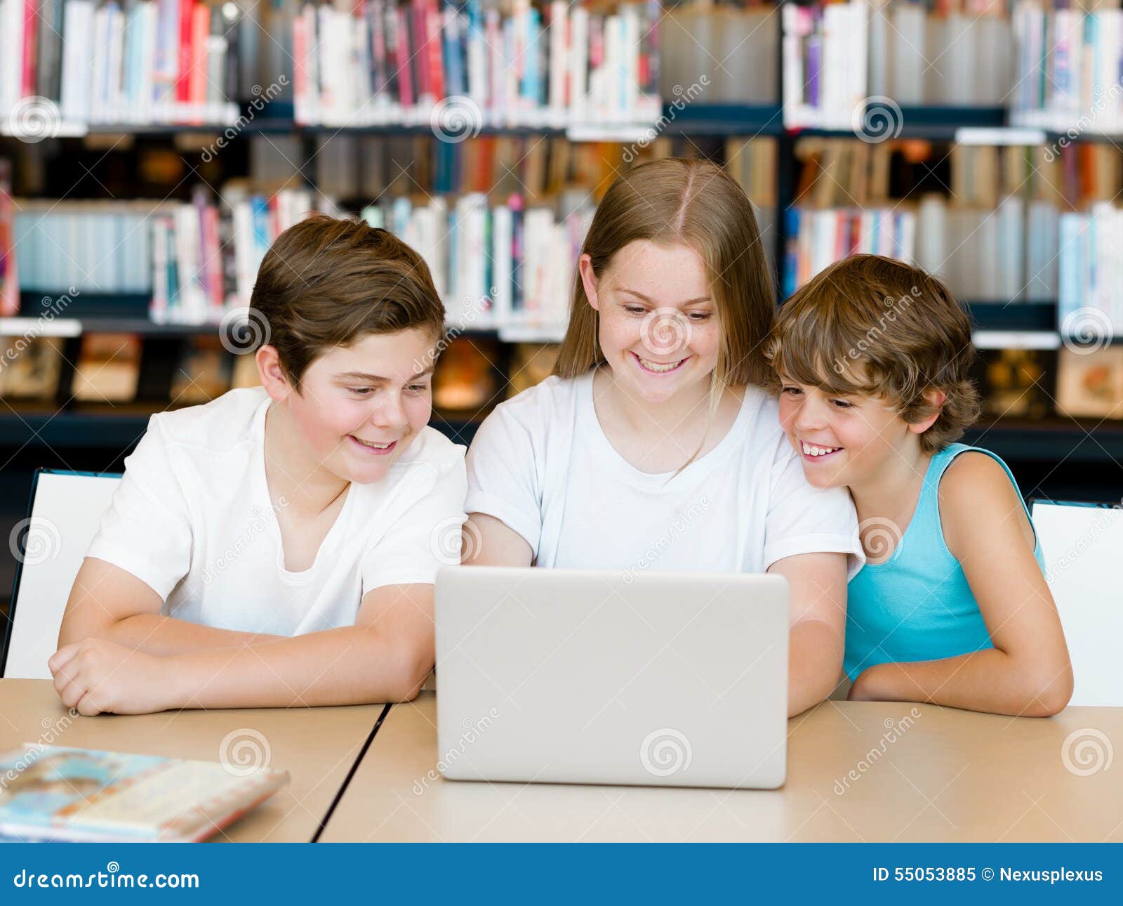 Three kids in library stock image. Image of person, library - 55053885