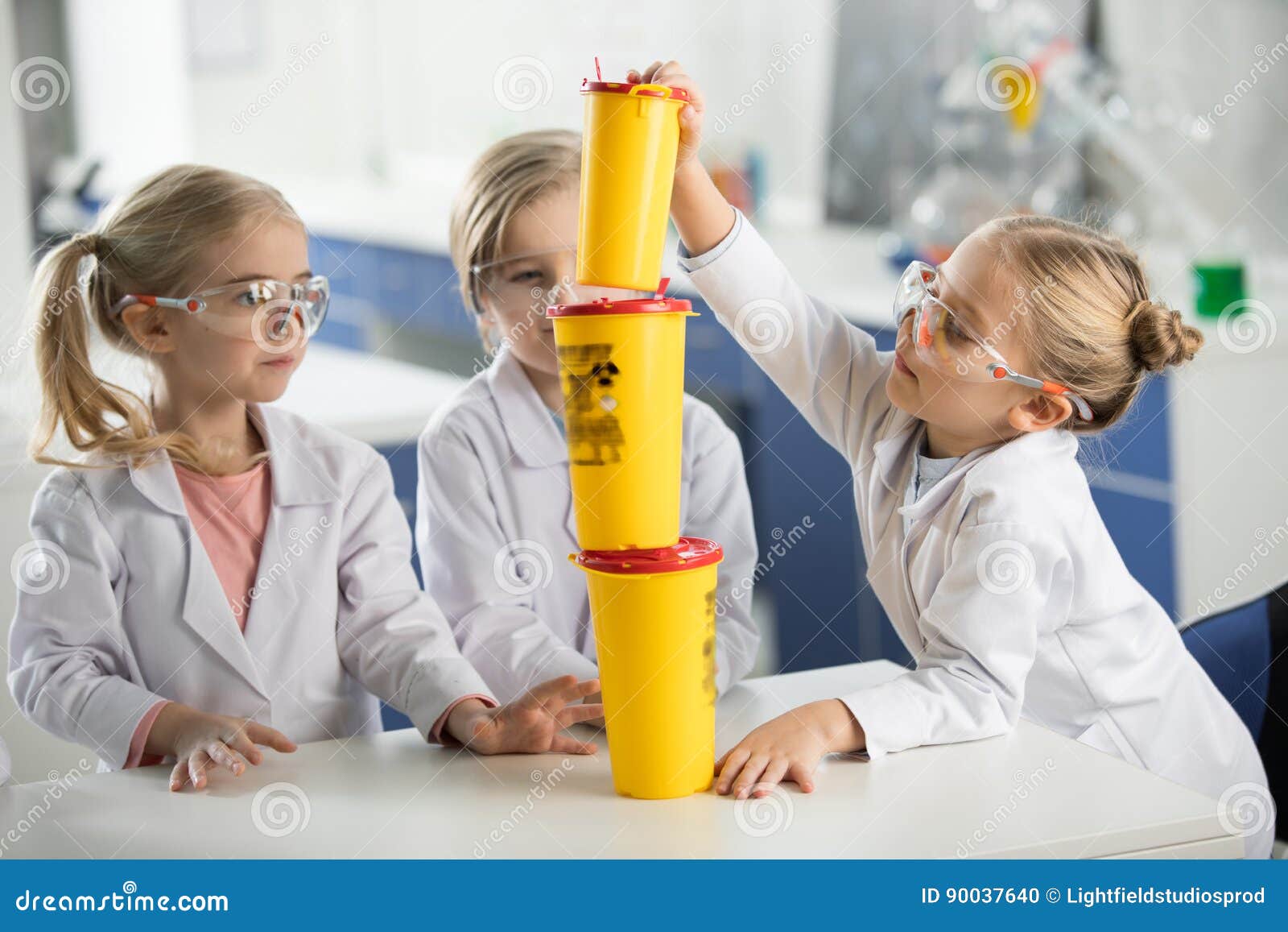Three Kids in Science Laboratory Wearing Lab Coats Stock Photo - Image ...
