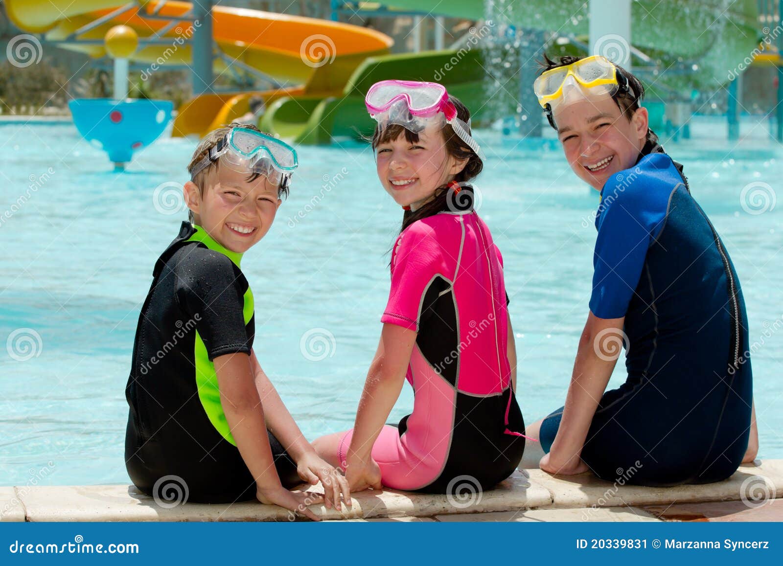 Three kids sitting by pool stock image. Image of black - 20339831