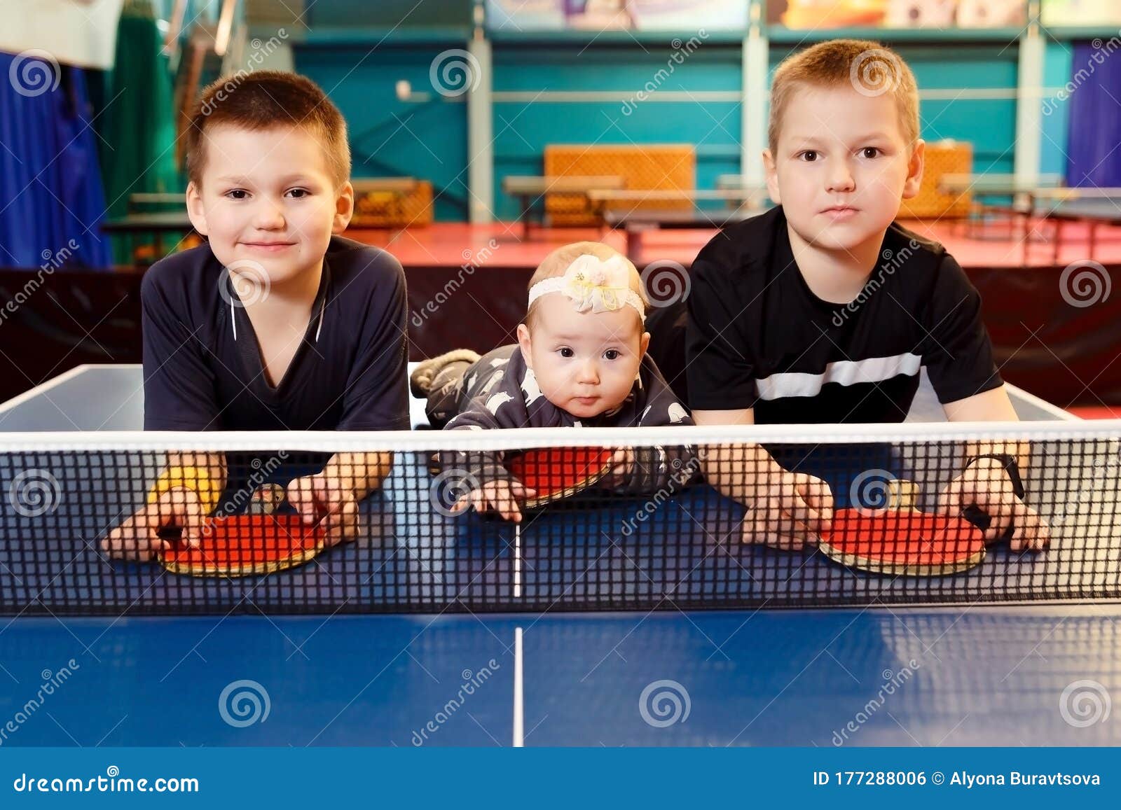 Three kids in table tennis stock photo. Image of concept - 177288006