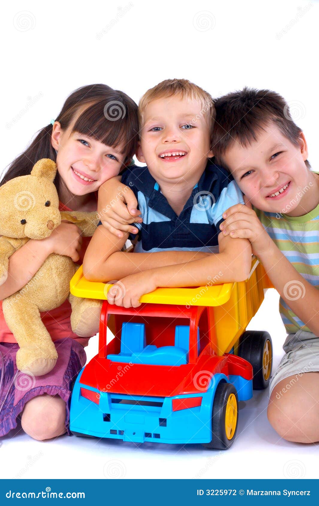 Three kids and their toys stock photo. Image of happy - 3225972