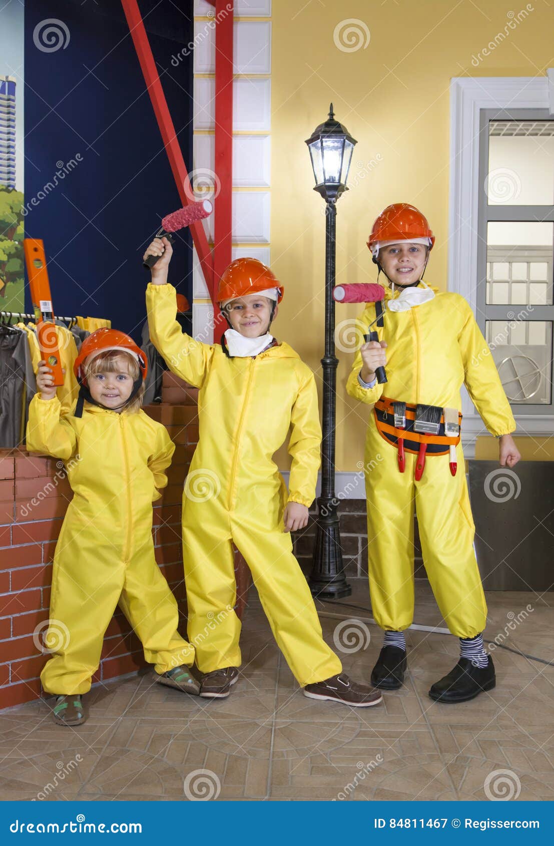 Three Kids Wearing Like Workers Standing with Construction Tools. Stock ...