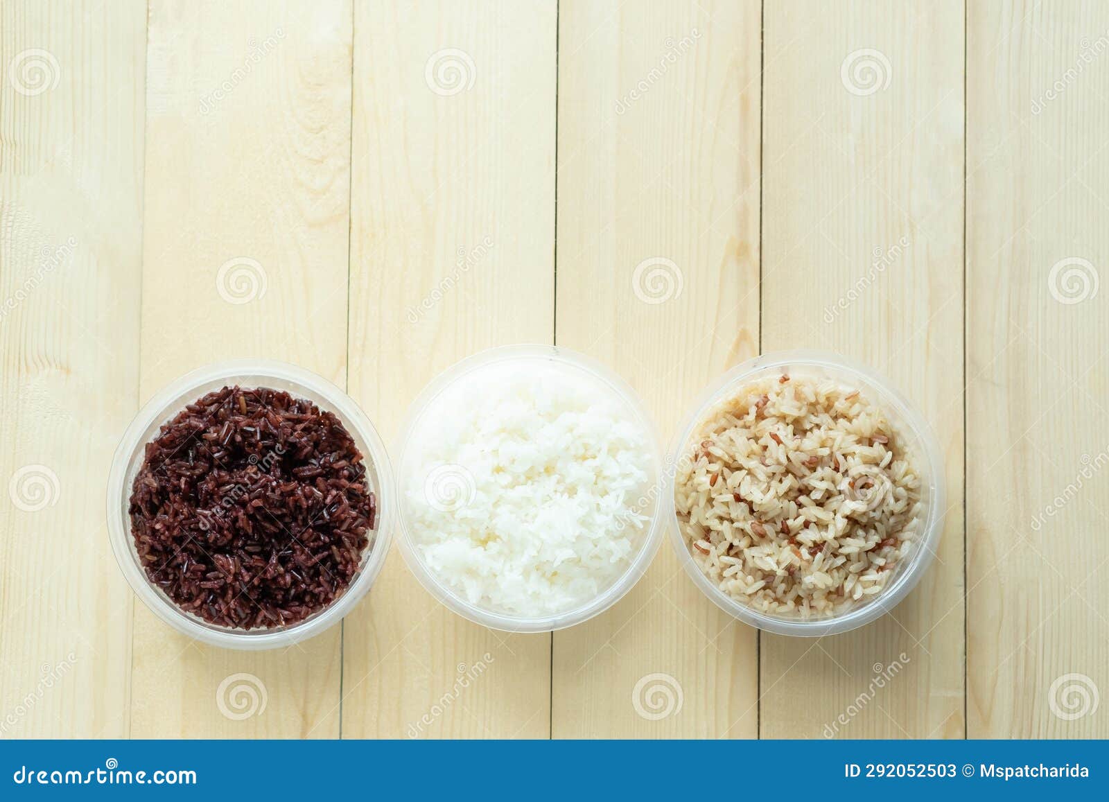 Three Kinds of Cooked Rice in Plastic Bowls on Wooden Table Stock Image ...