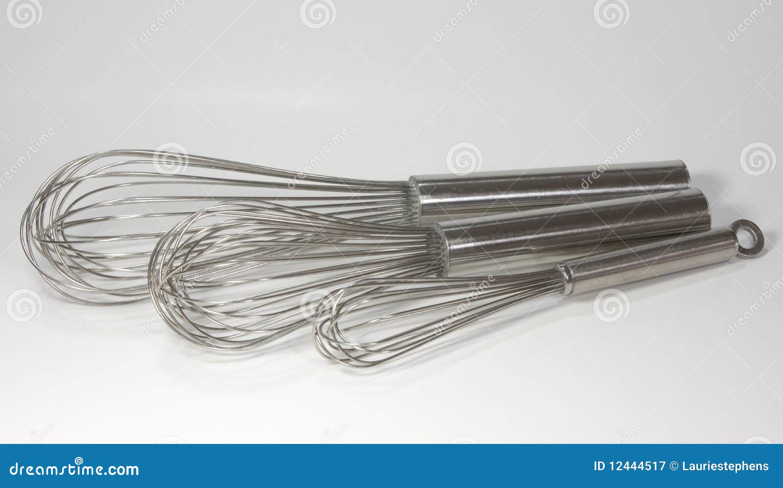 Three kitchen wire whisks stock image. Image of object - 12444517