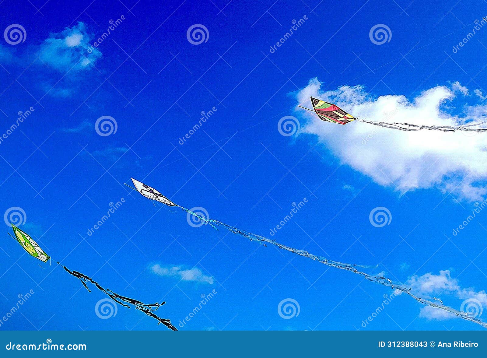 Three kites in the sky stock image. Image of weekend - 312388043