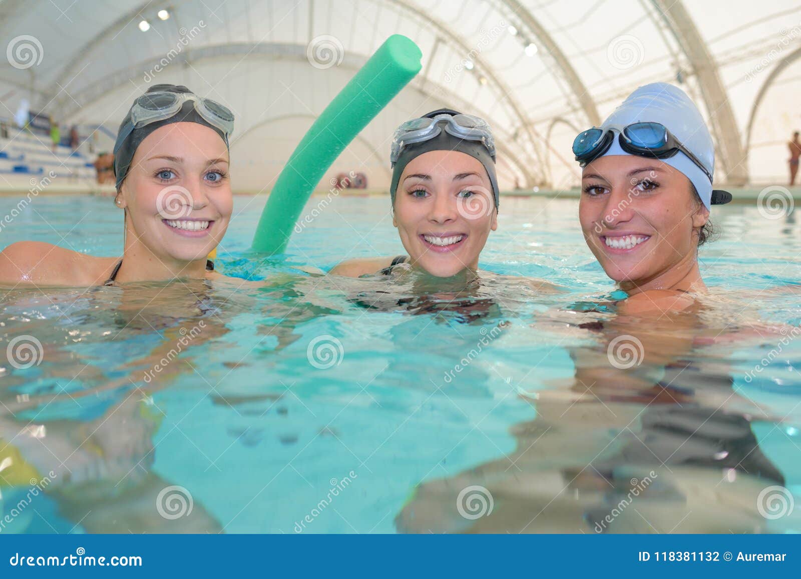 Three Ladies in Indoor Pool Stock Photo - Image of goggles, happy ...