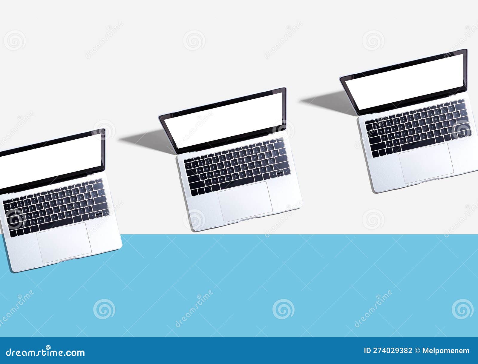 Three Laptop Computers with Shadow Stock Photo - Image of remote ...