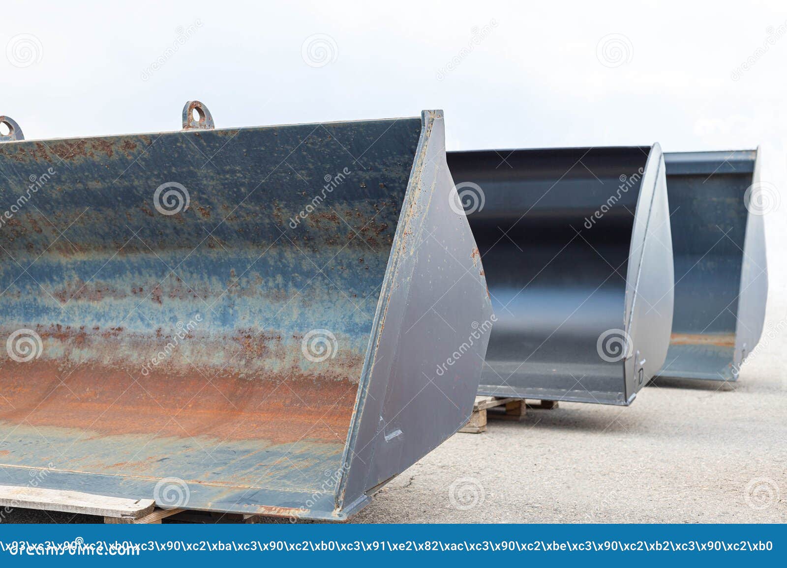 Three Large Buckets Lie on the Ground. Close-up. Isolate. Stock Photo ...