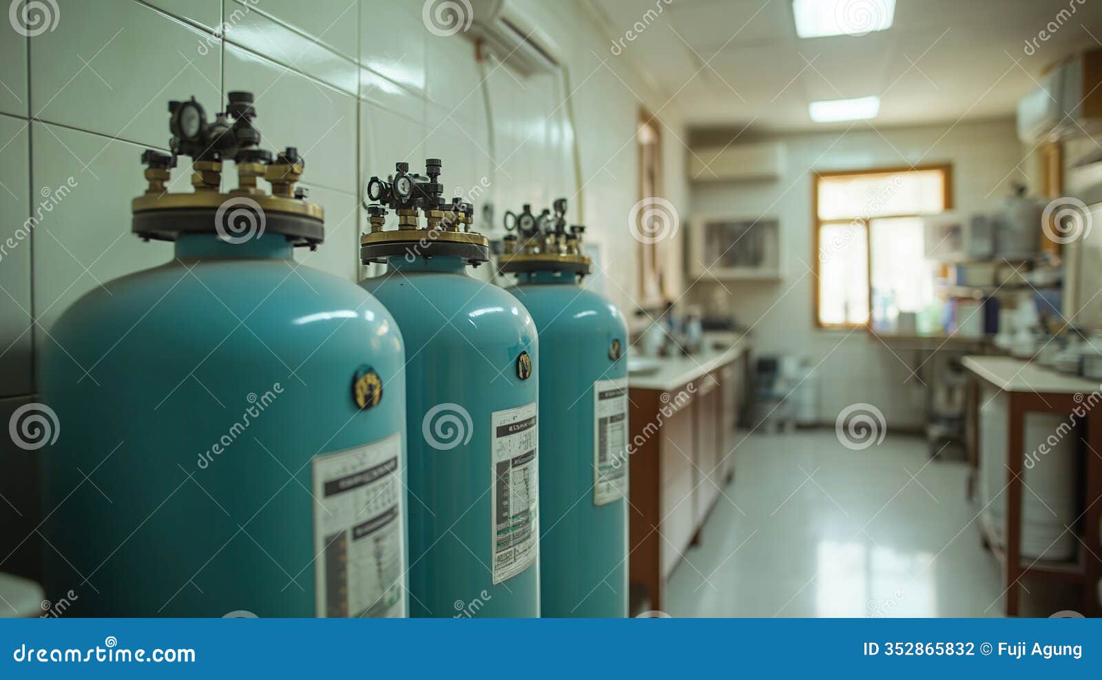 Three Large Teal Gas Cylinders in a Medical or Scientific Lab Setting ...