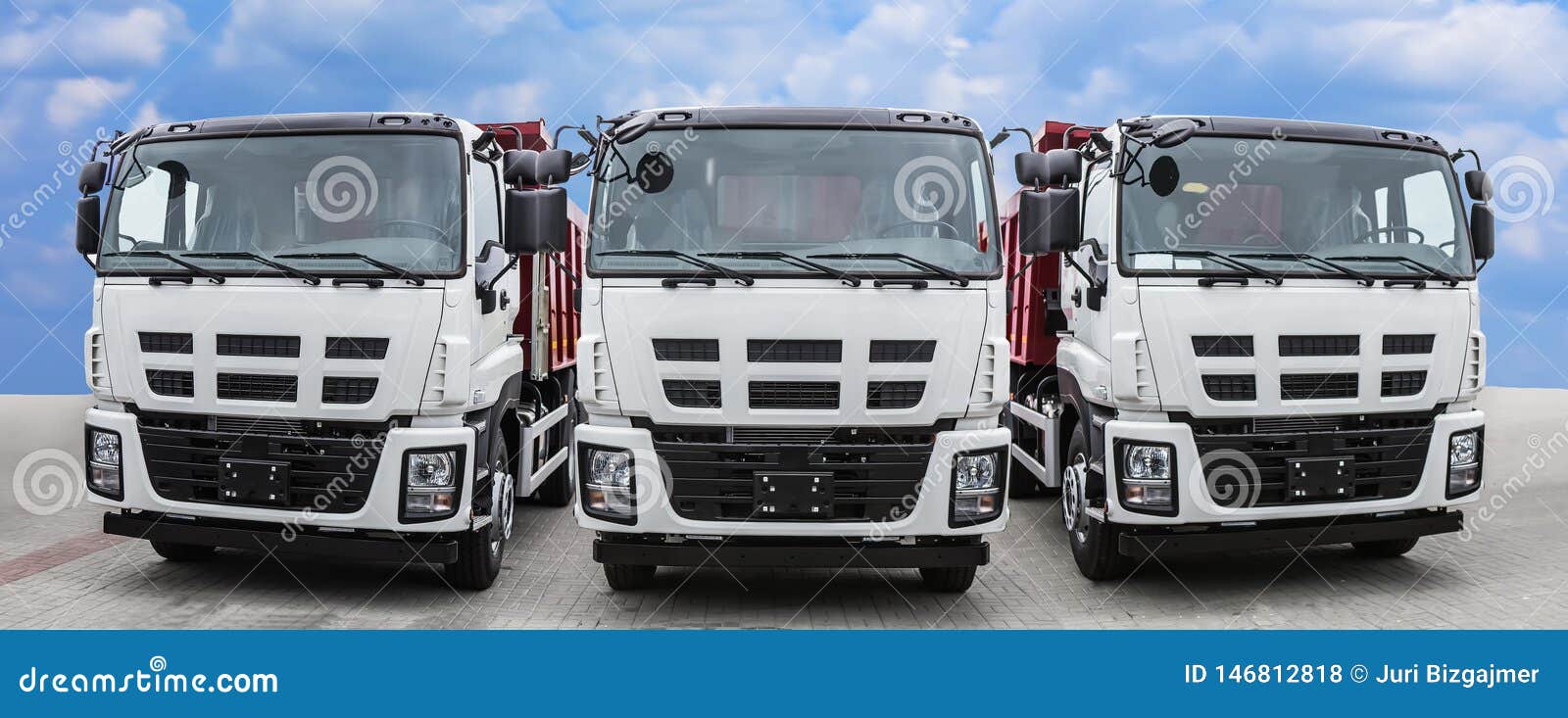 Three Large Trucks Front View on the Road Stock Photo - Image of ...