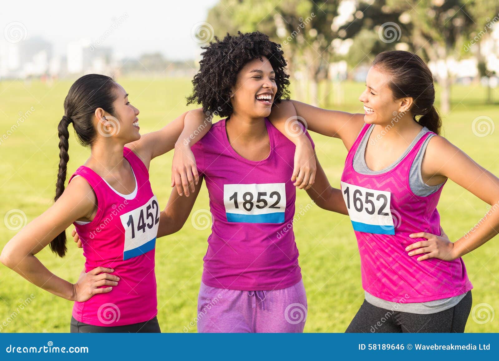 Three Laughing Runners Supporting Breast Cancer Marathon Stock Photo ...