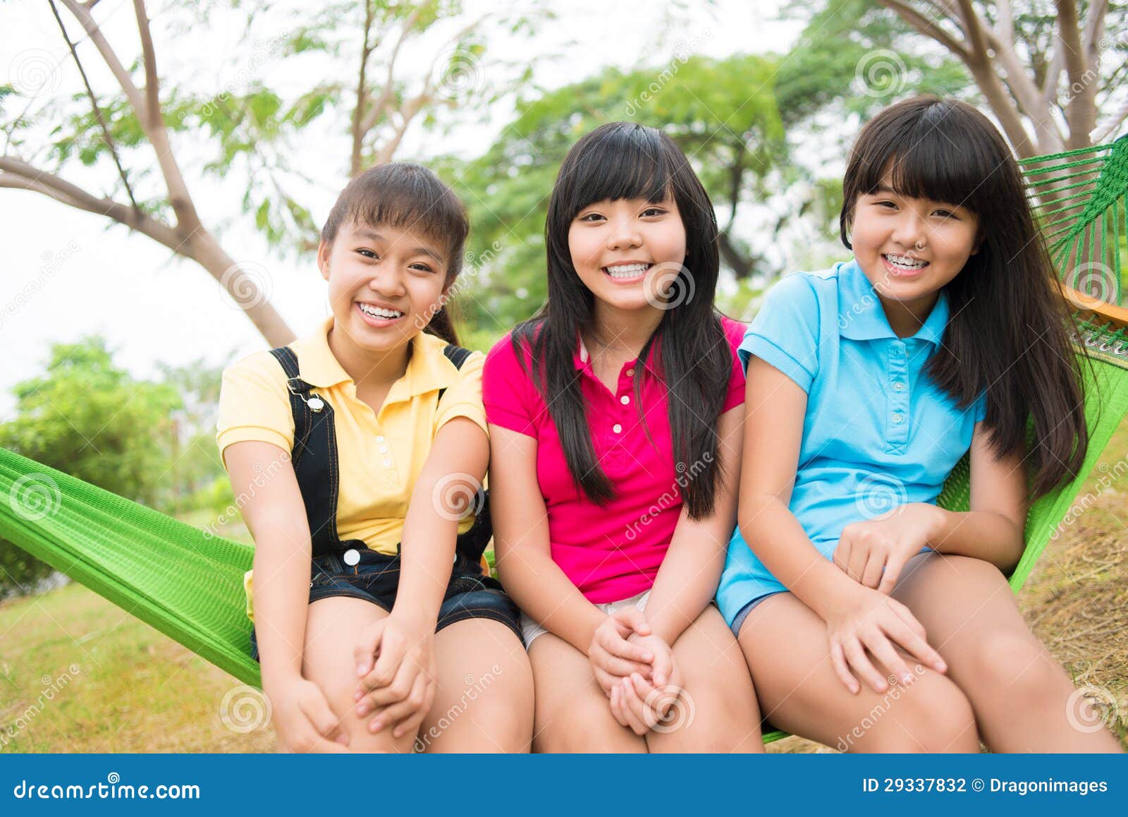Three laughing sisters stock photo. Image of person, friendly - 29337832