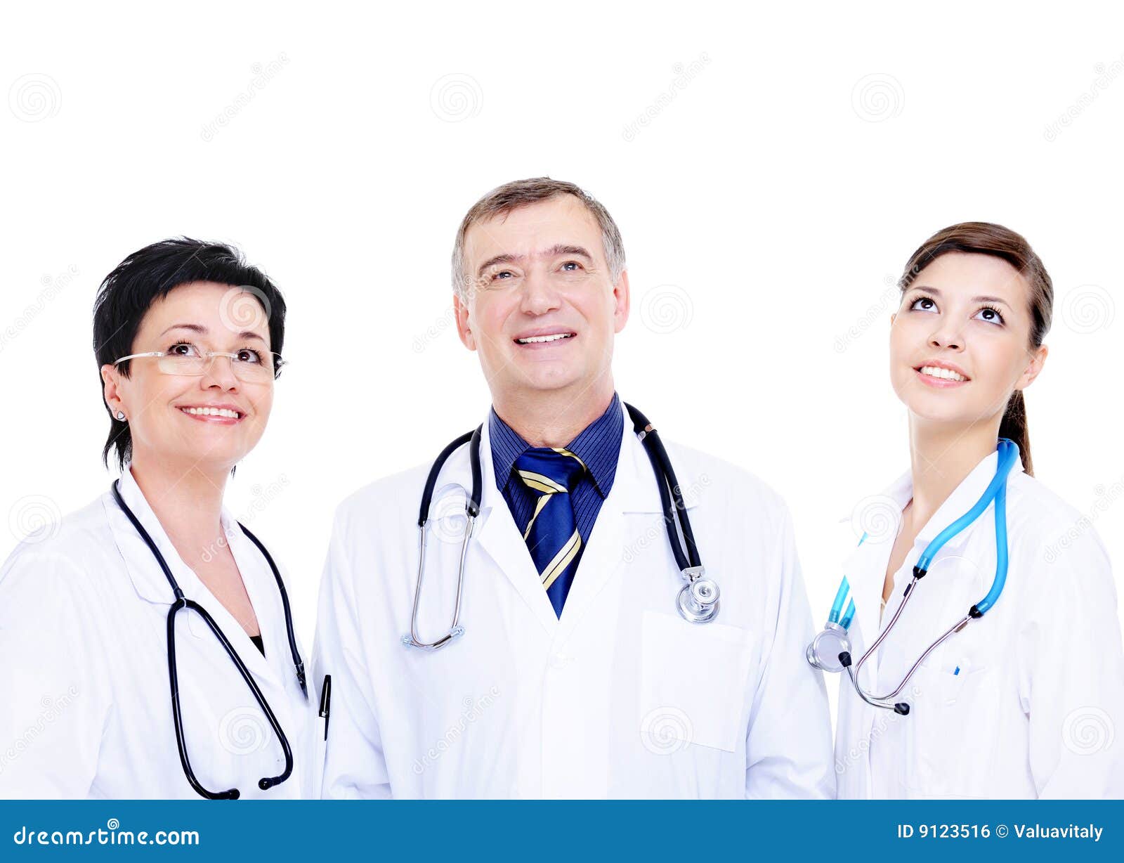 Three Laughing Successful Doctors Looking Up Stock Photo - Image of ...