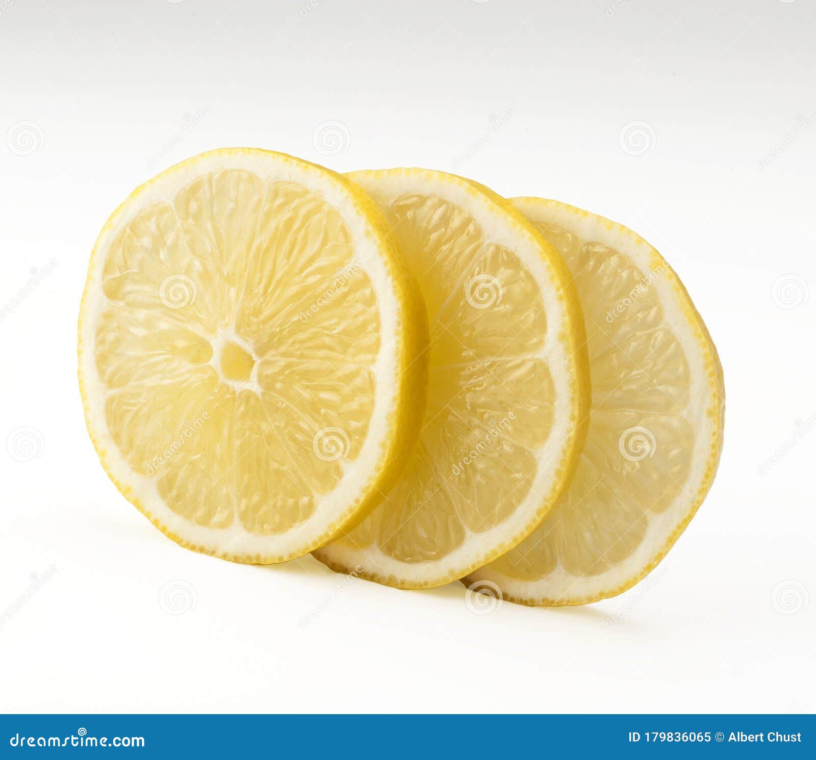 Three Lemon Slices in Vertical Position on White Background Stock Image ...