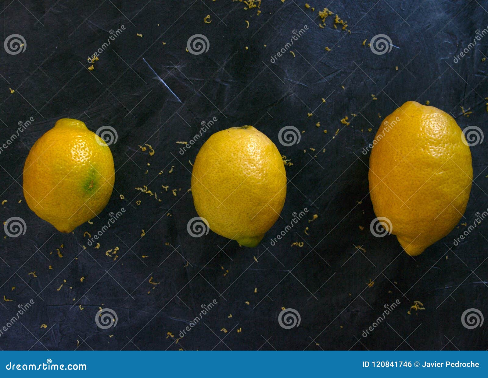Three Lemons in Different Sizes Stock Photo - Image of green, table ...