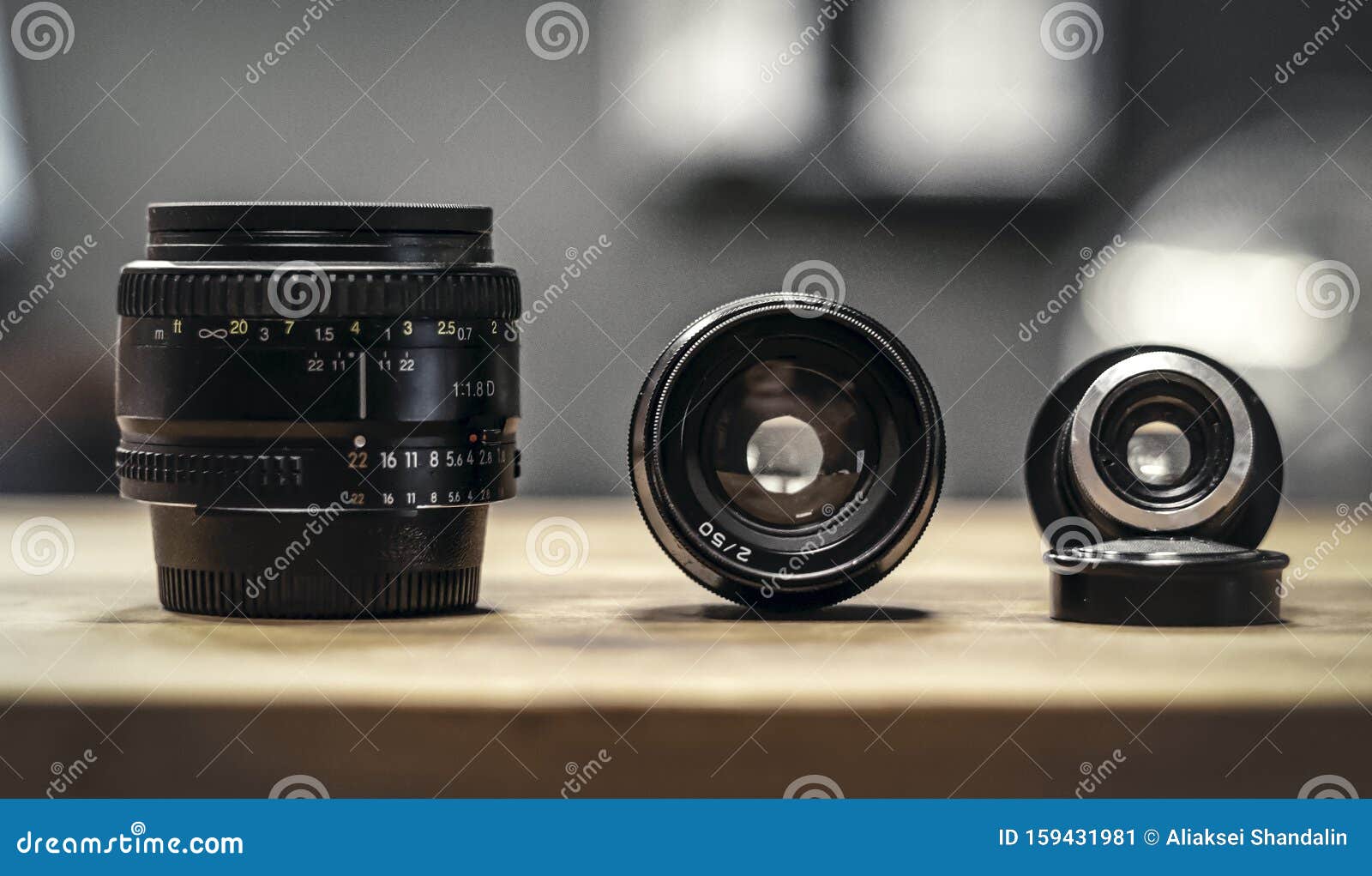 Three Lenses on a Wooden Stand. Stock Image - Image of camera, black ...