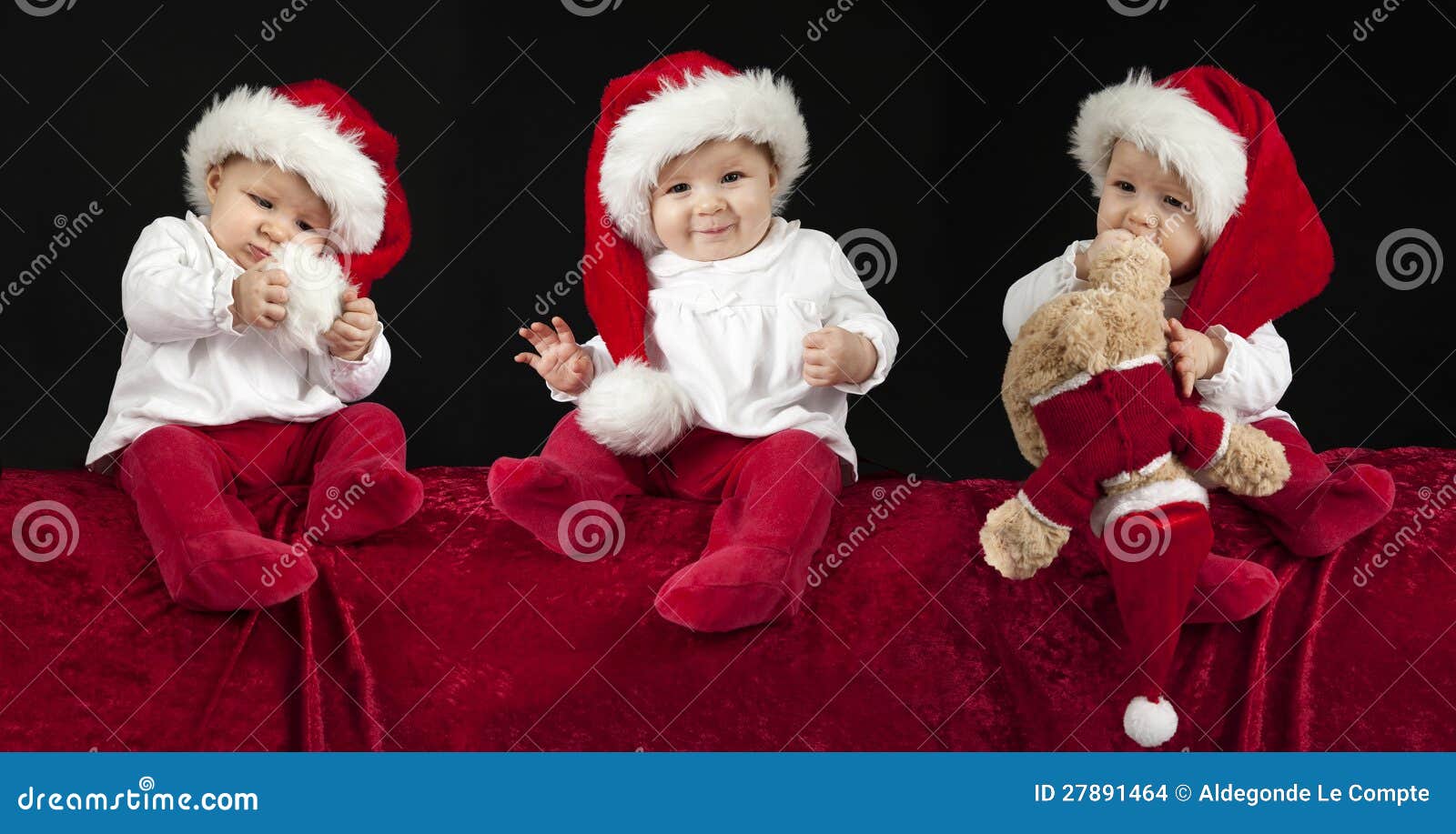 Three Little Babies with Christmas Hat Stock Photo - Image of childhood ...