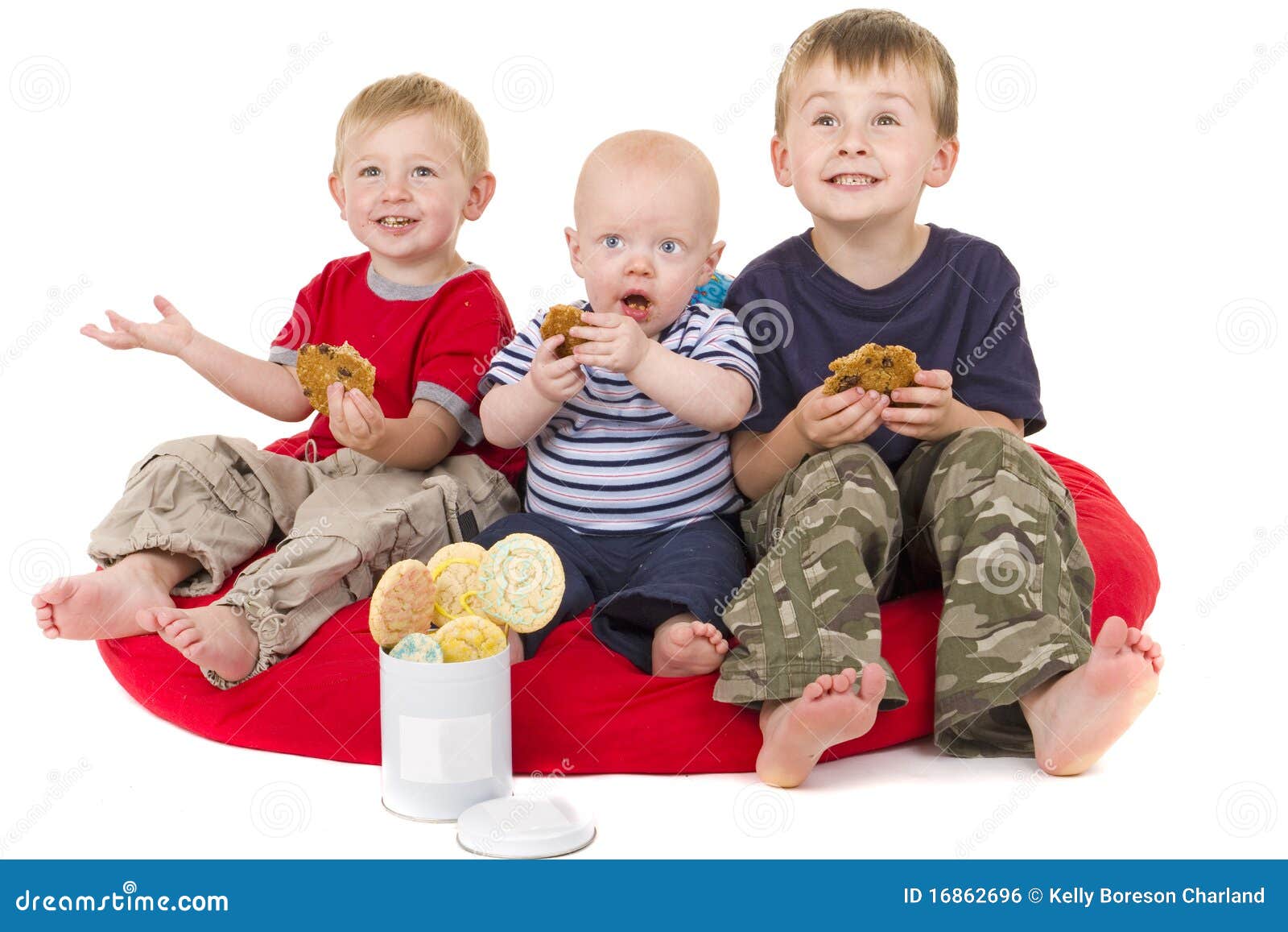 Three Little Boys Enjoys Eating Cookie Stock Photo - Image of little ...