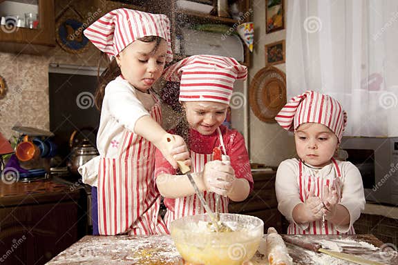 Three Little Chefs in the Kitchen Stock Image - Image of cooking ...